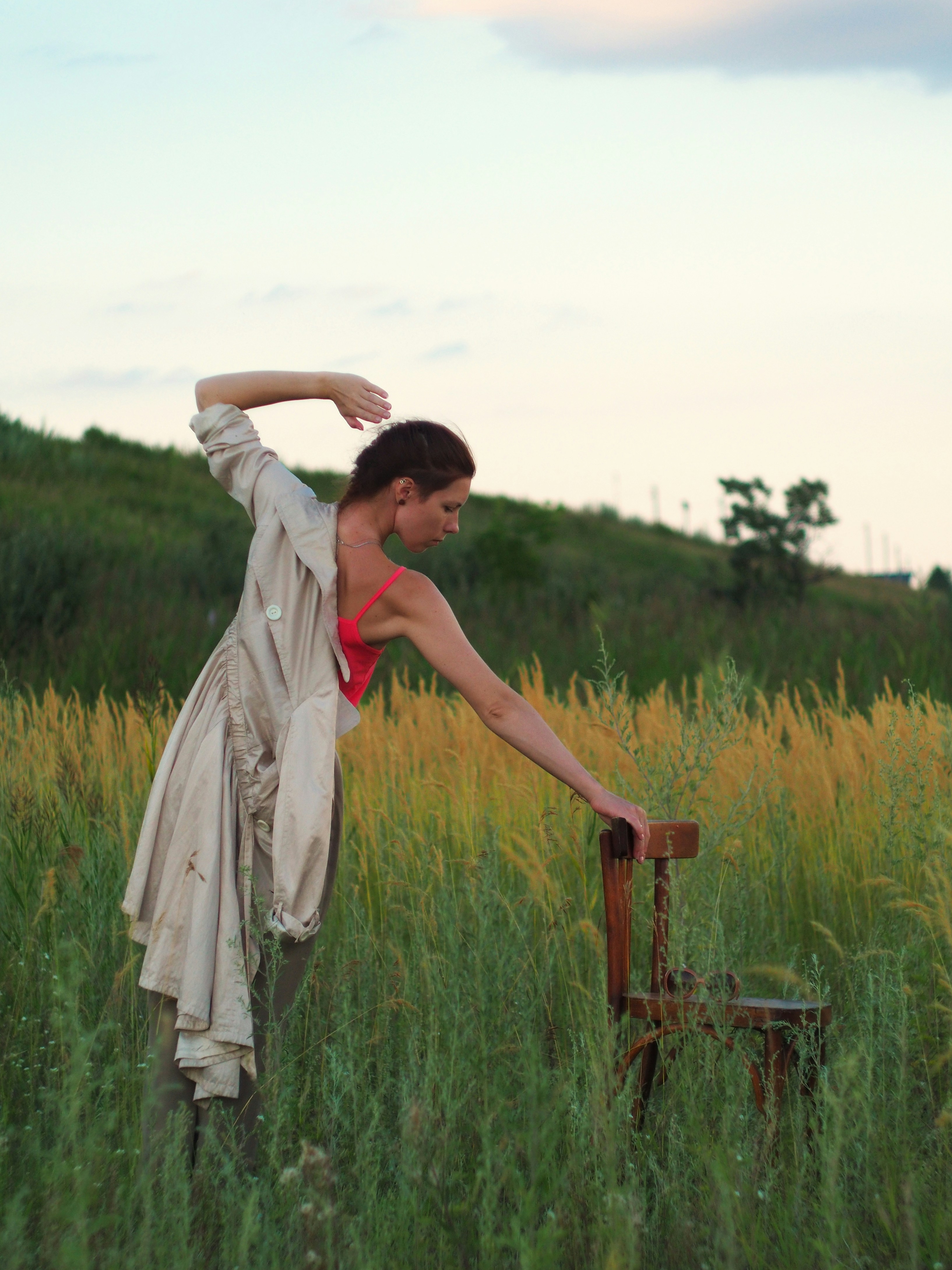 Meadow Reverie: A Lean Toward a Weathered Chair at Golden Hour
