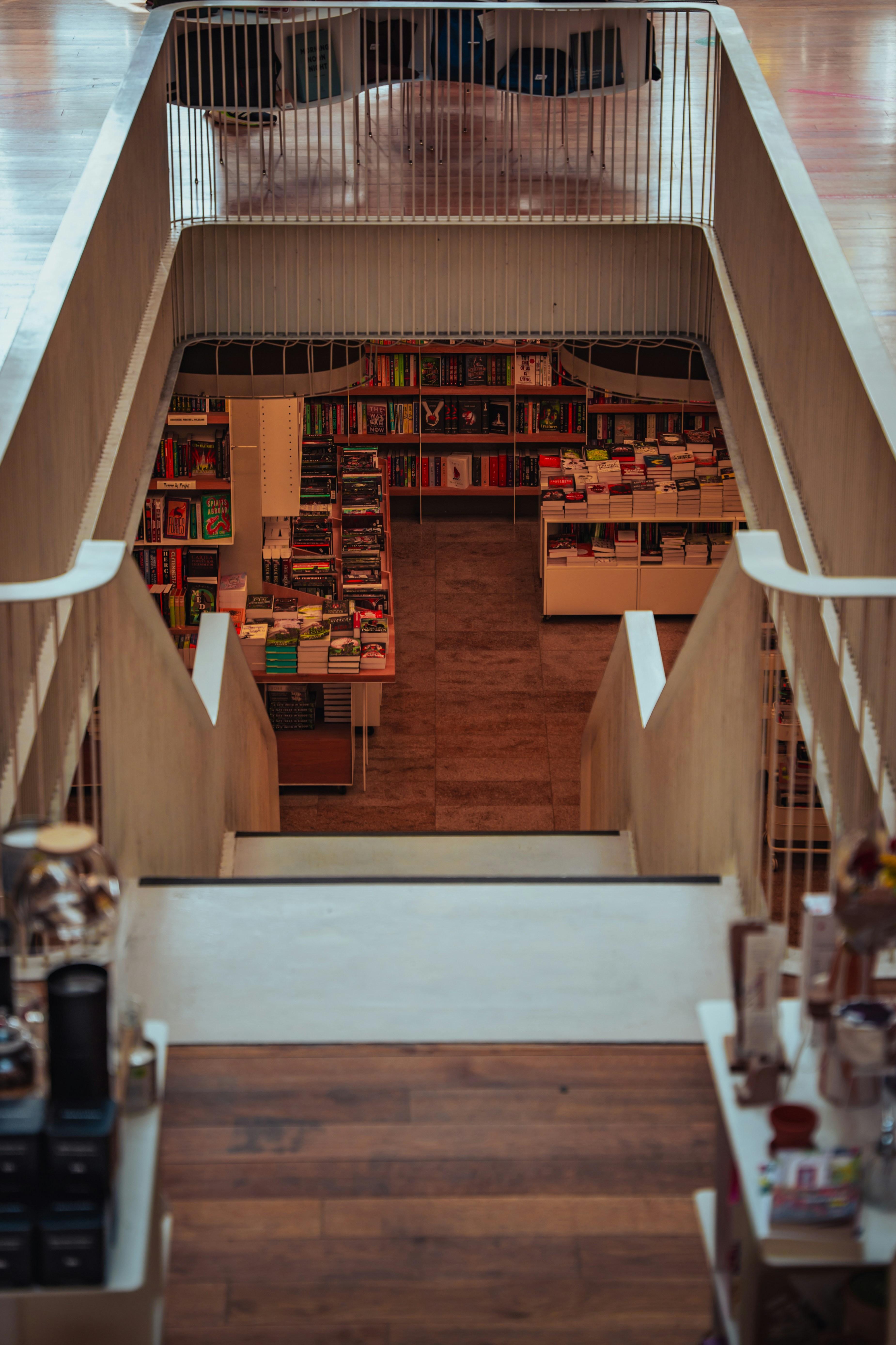 An overhead view of a library with a staircase photo – Free Wallpaper ...