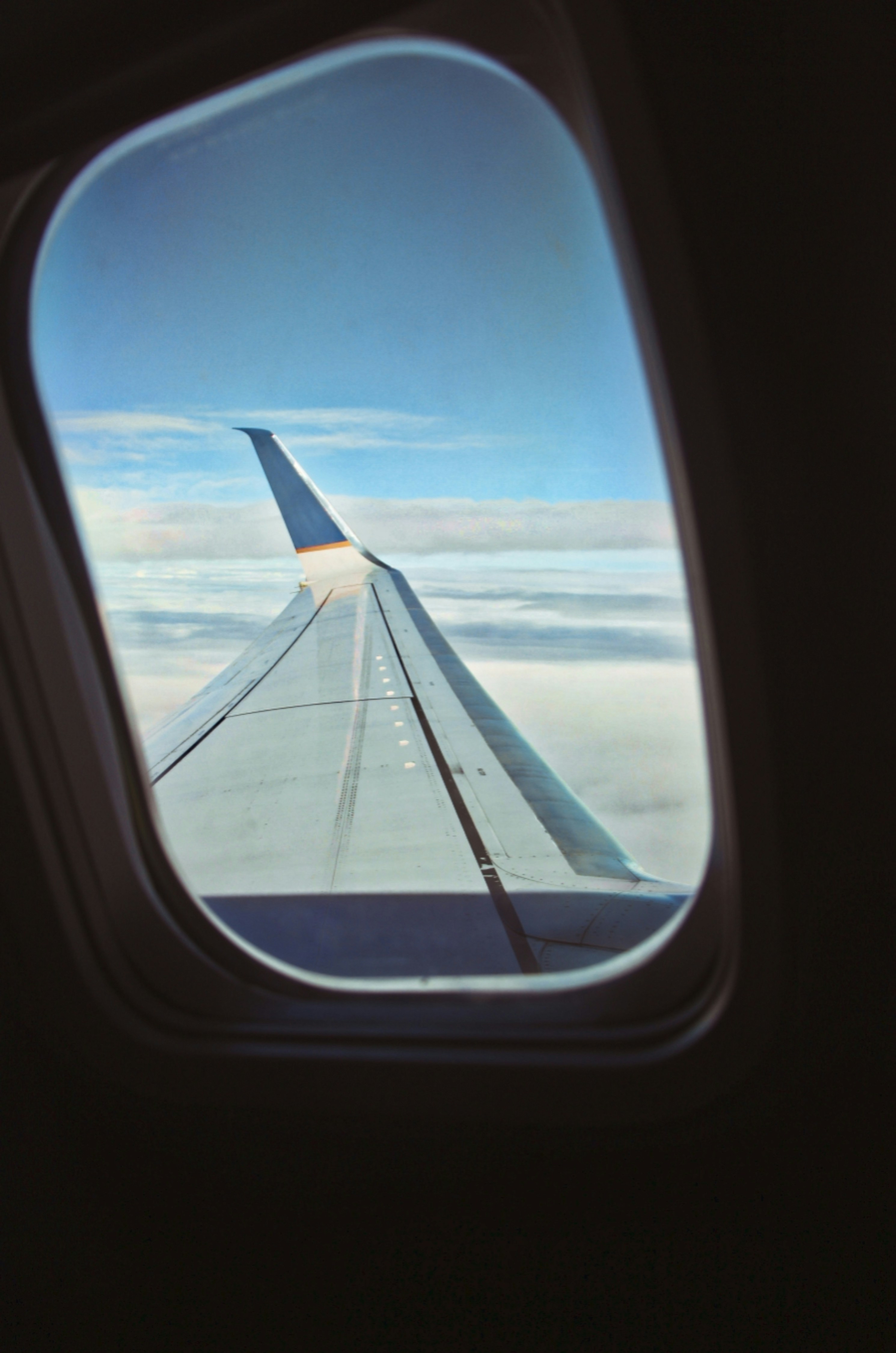 A view of the wing of an airplane through a window photo – Free Car ...