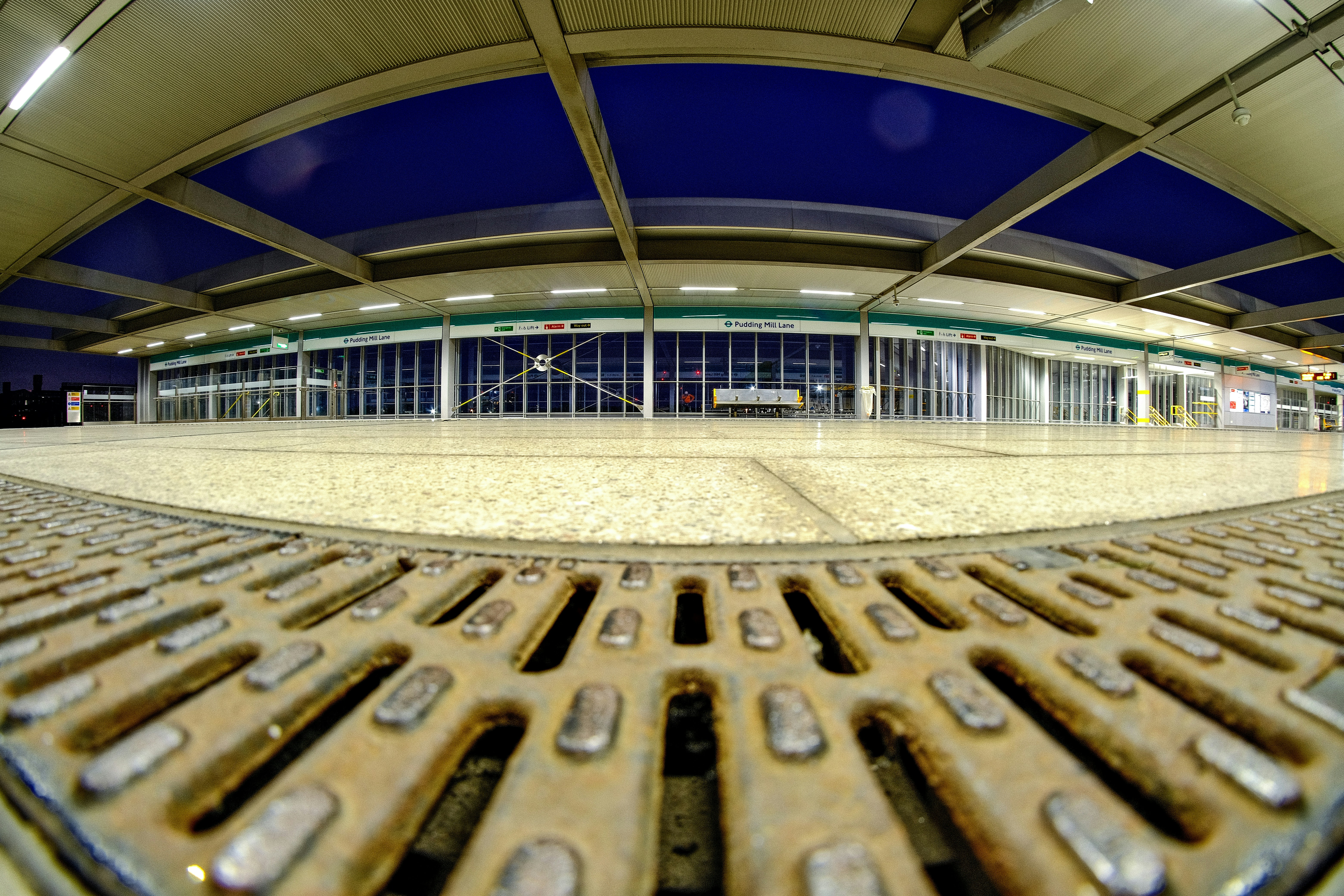 Grate to Glass: A Low-Angle Transit Hall Perspective