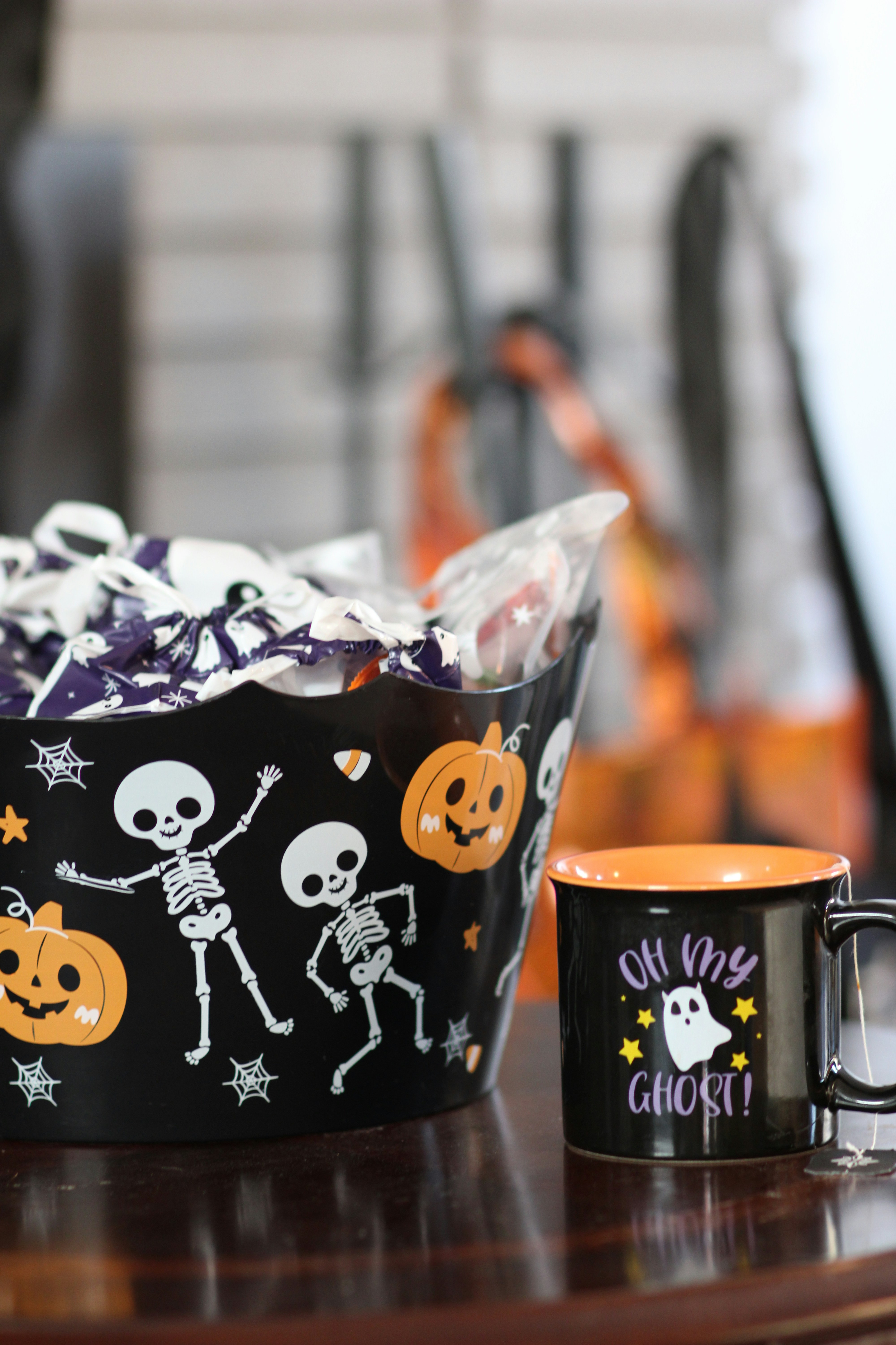 Basket of Halloween Whimsy: Skeletons, Pumpkins, and a Ghostly Mug