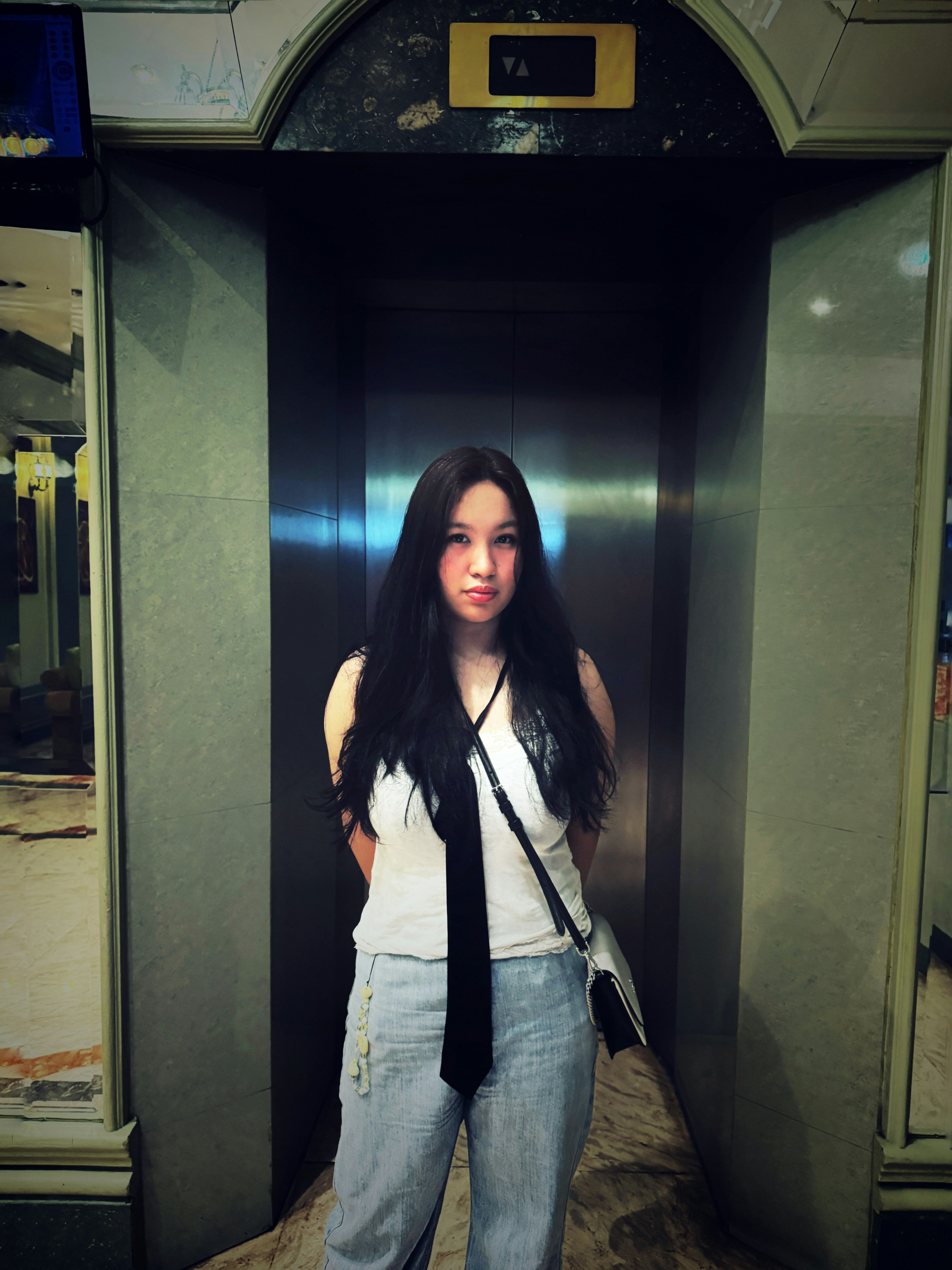 Elevator Quiet Confidence: A Portrait in Neon Hallways