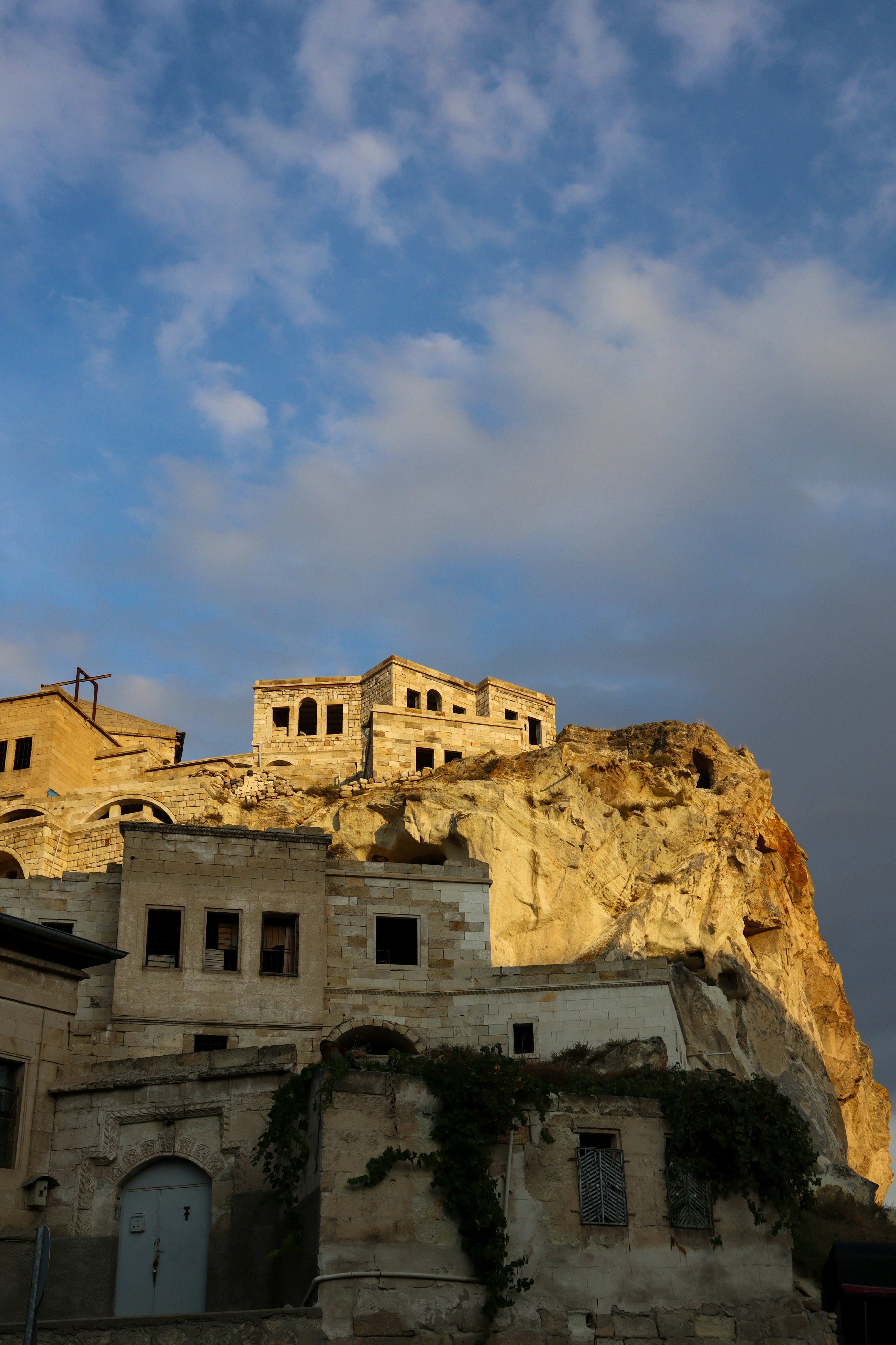 Cliff-top Ruins Bathed in Warm Late-Afternoon Light