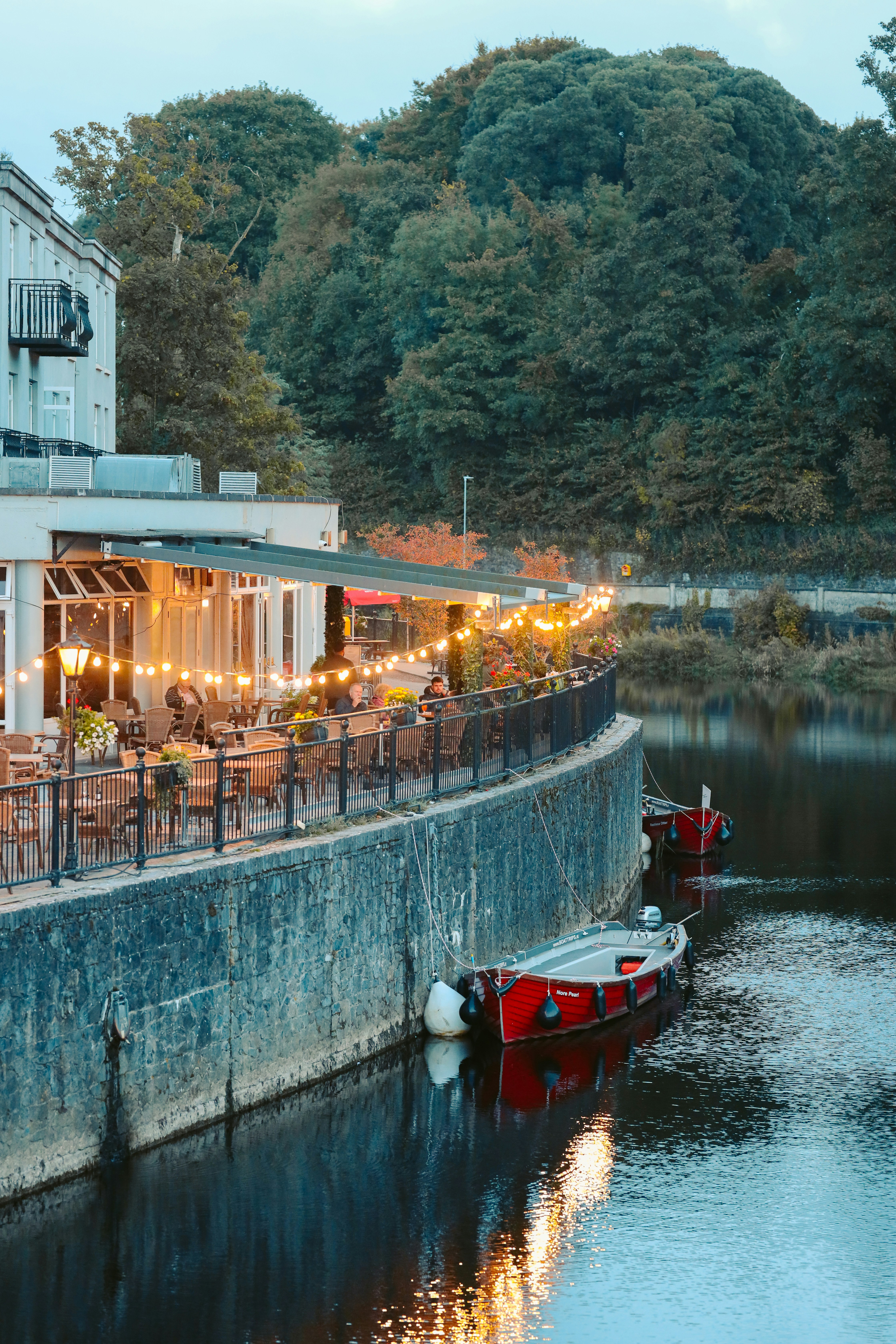  twilight promenade: lanterns along the riverside cafe
