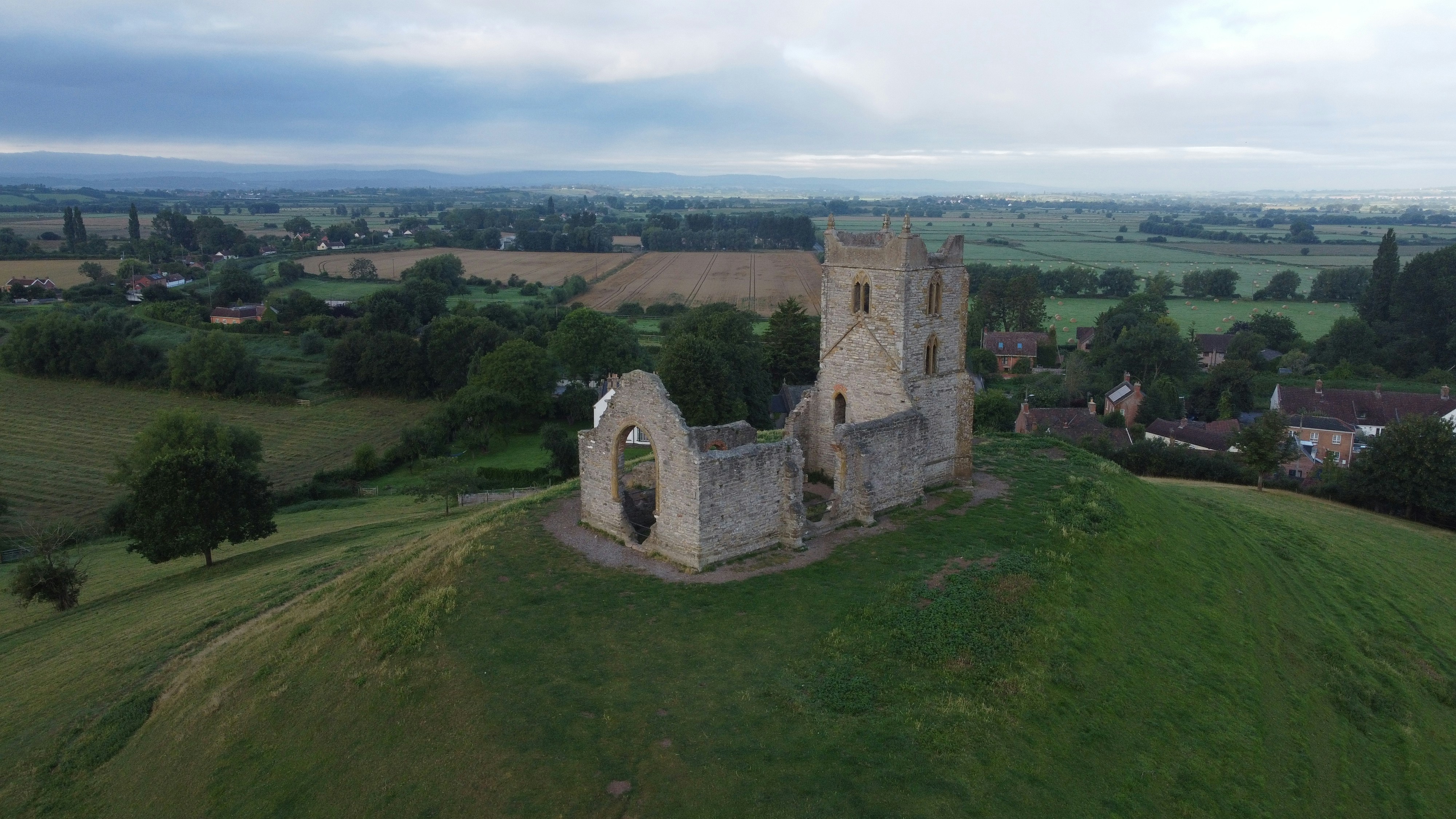 An aerial view of a castle on a hill photo – Free Burrow mump Image on ...