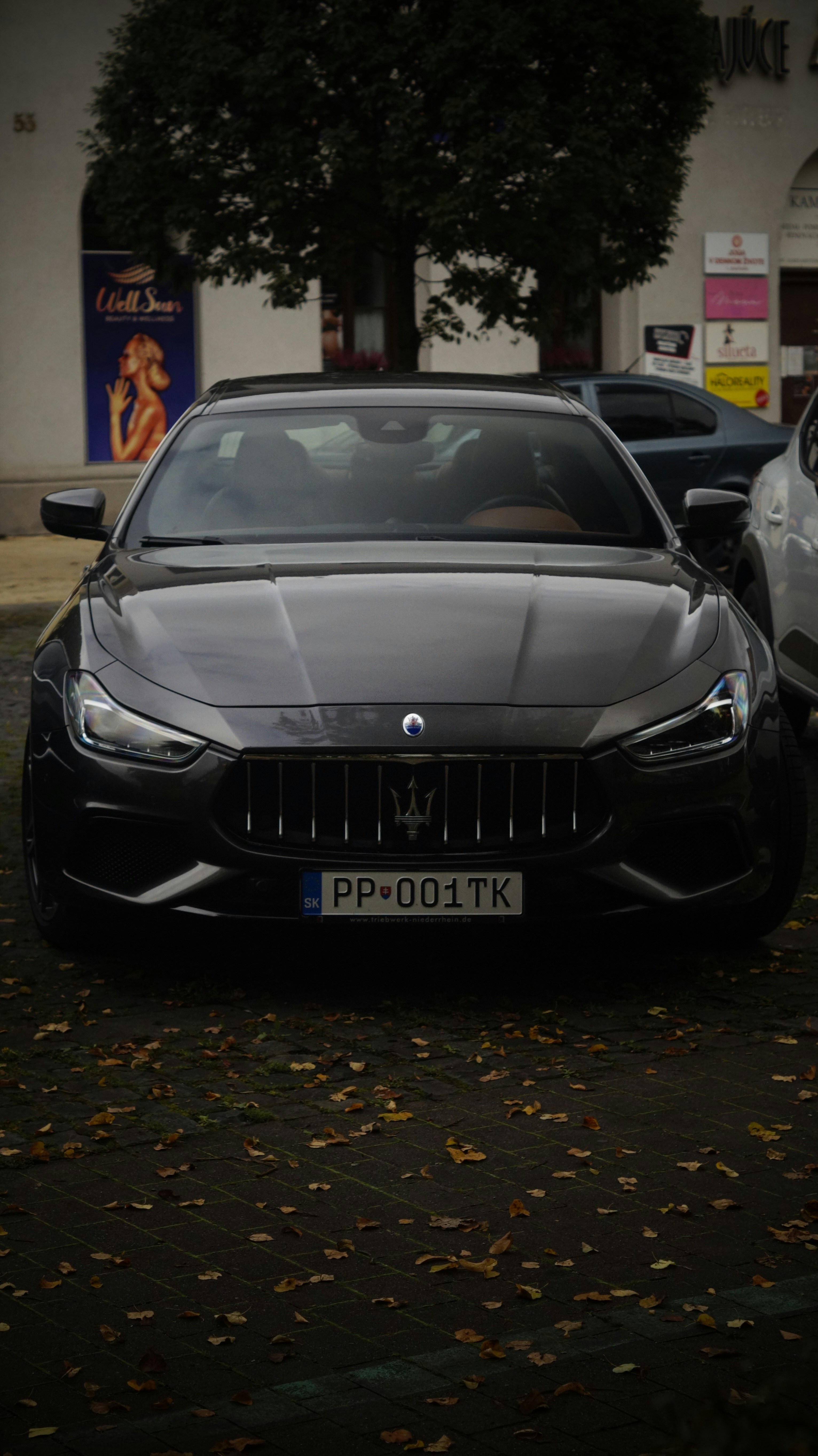 Midnight Maserati: Front-and-Center Grille Under City Lights