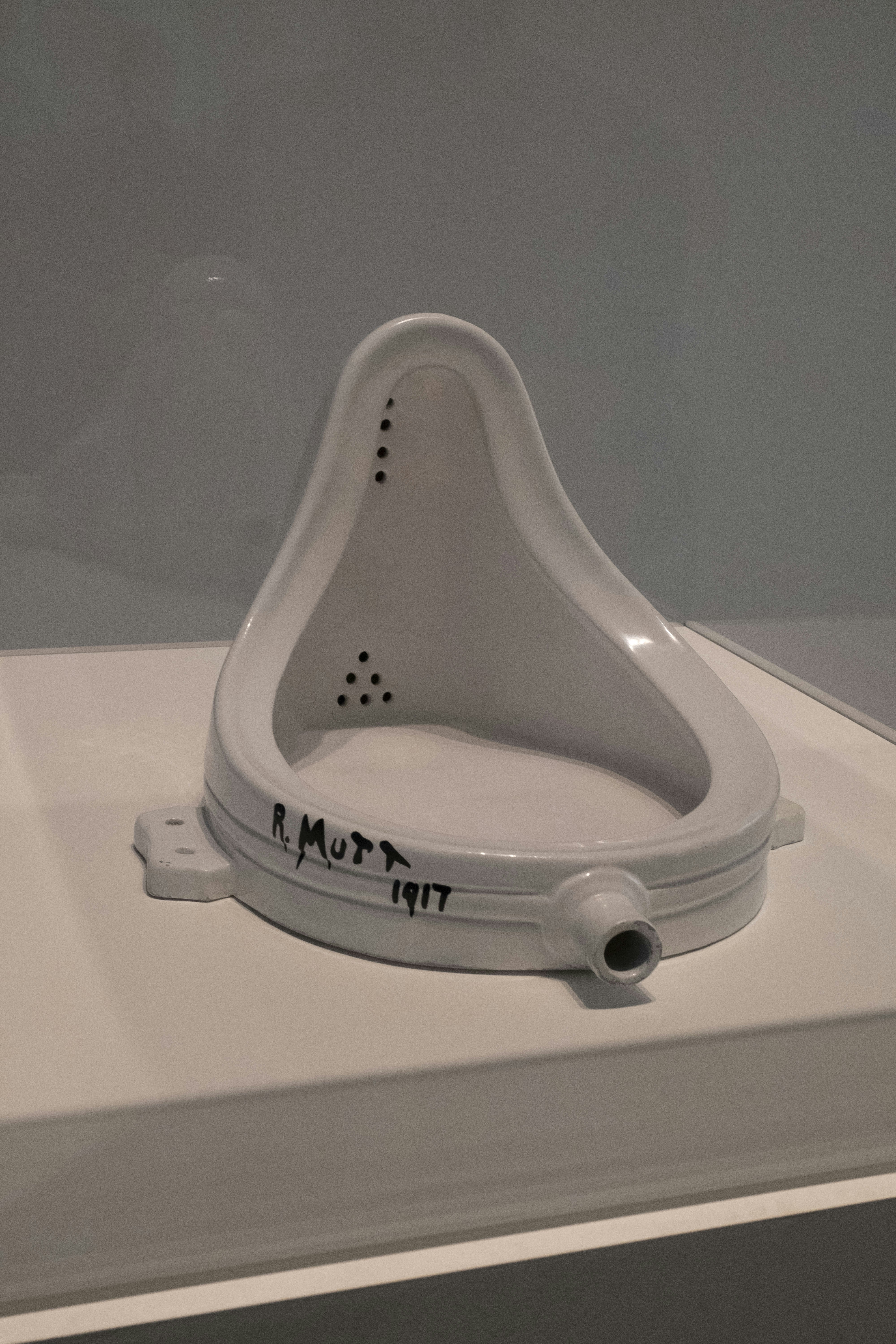 The Quiet Curve: A White Ceramic Urinal as Sculptural Form