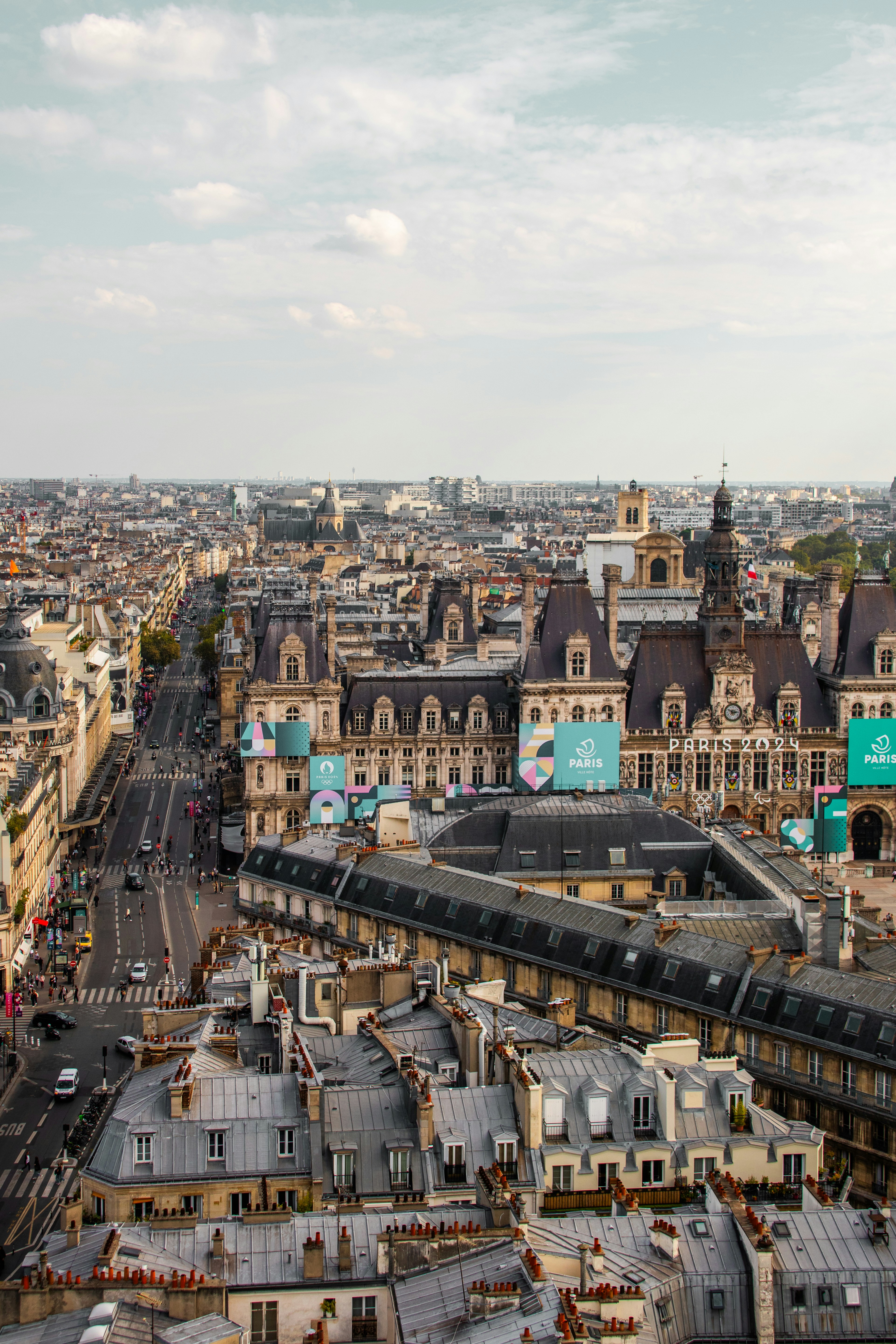 A view of a city from the top of a building photo – Free Car Image on ...