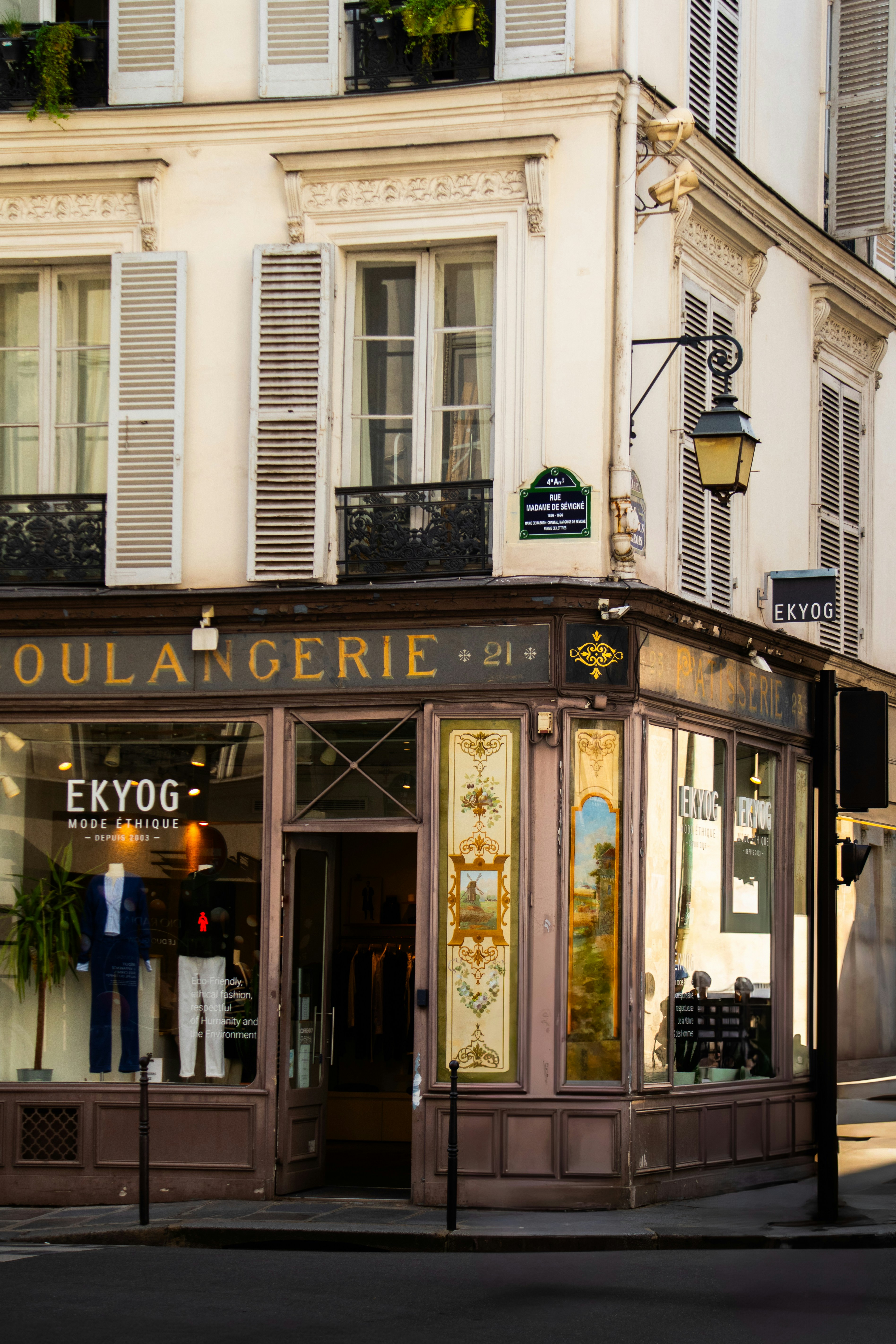 Parisian storefront glow: the corner ÉkYog boutique under soft morning light