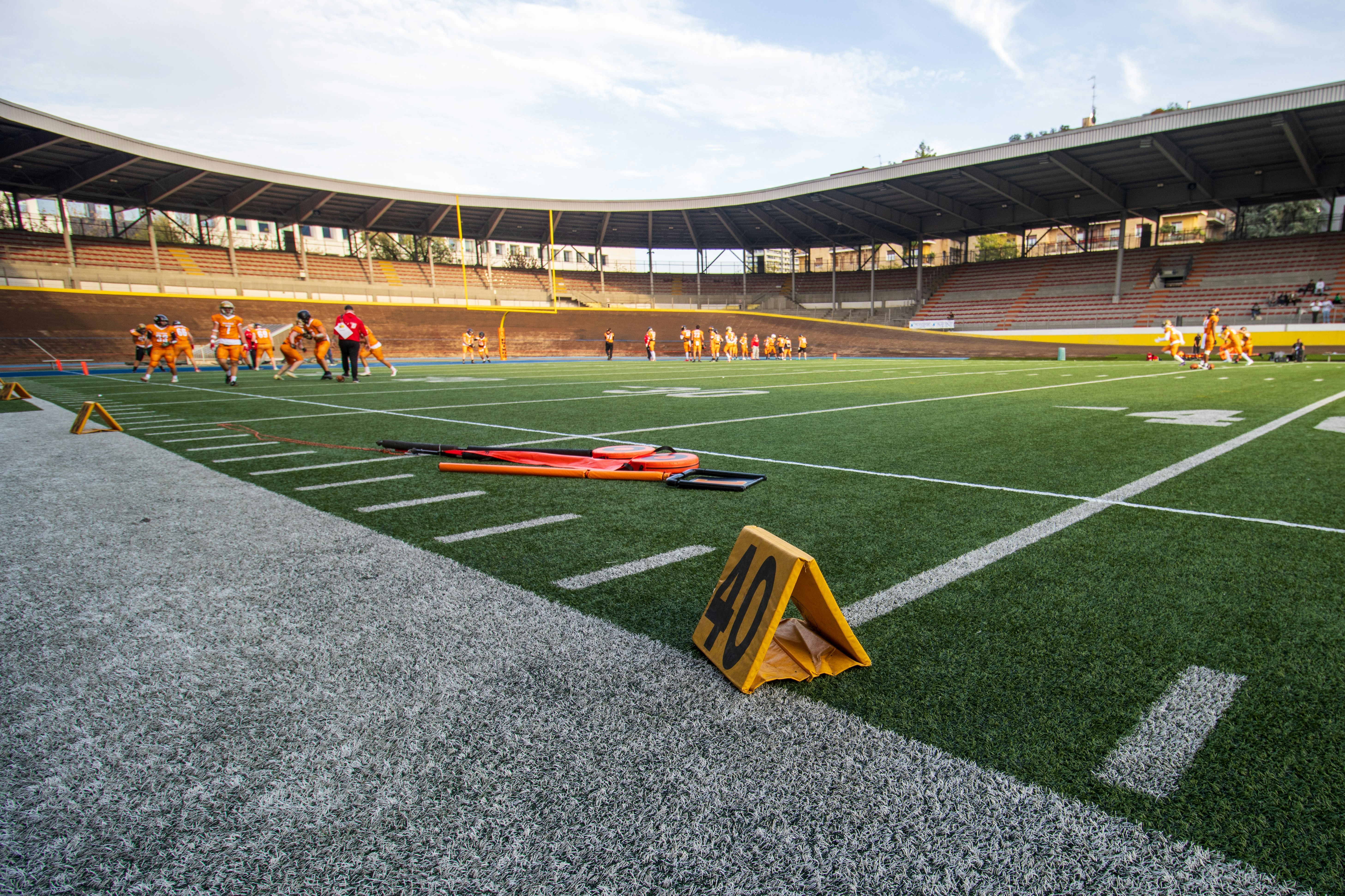 A view of a football field from the sidelines photo – Free American ...