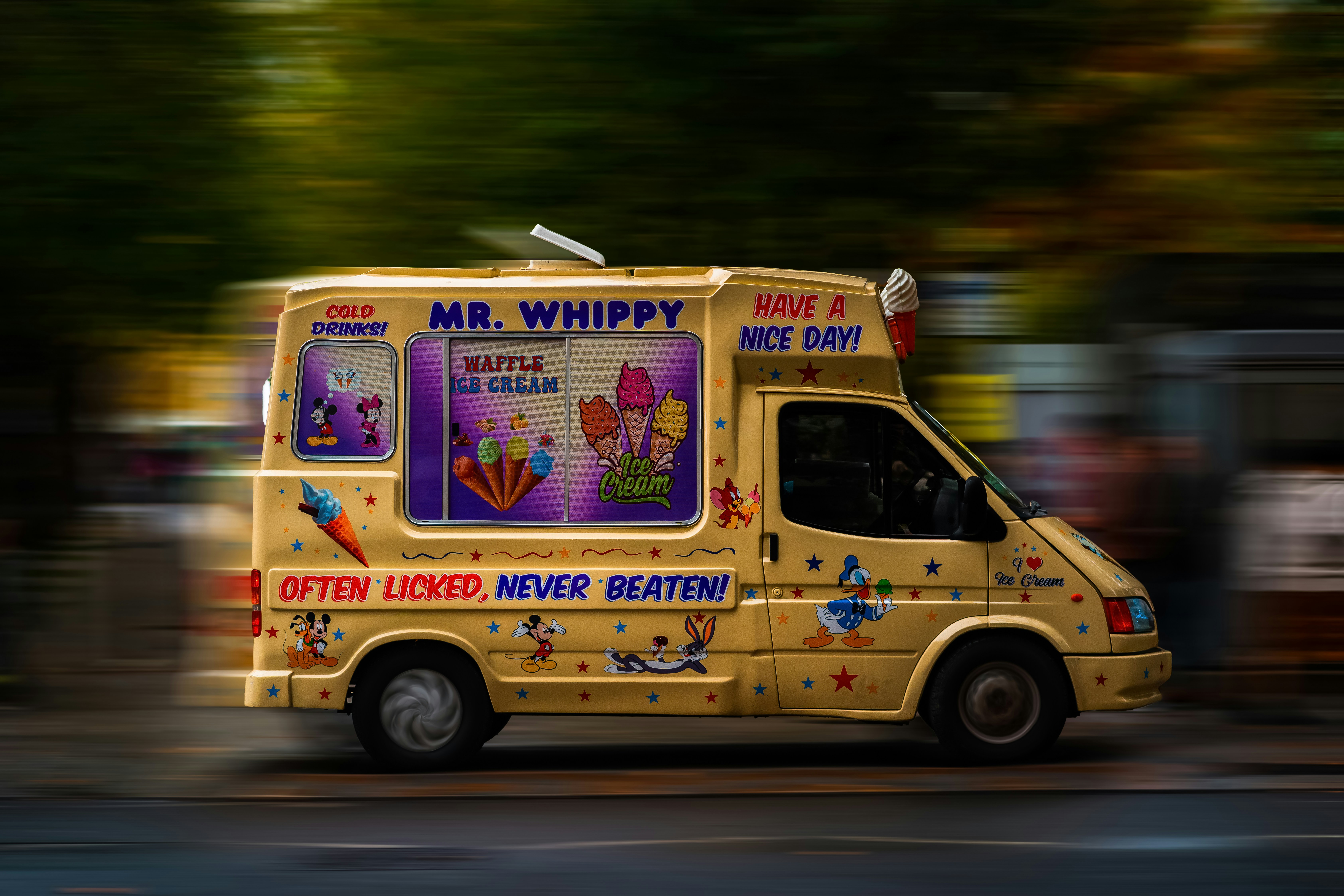 Whimsy on Wheels: The Golden Ice-Cream Caravan in Motion