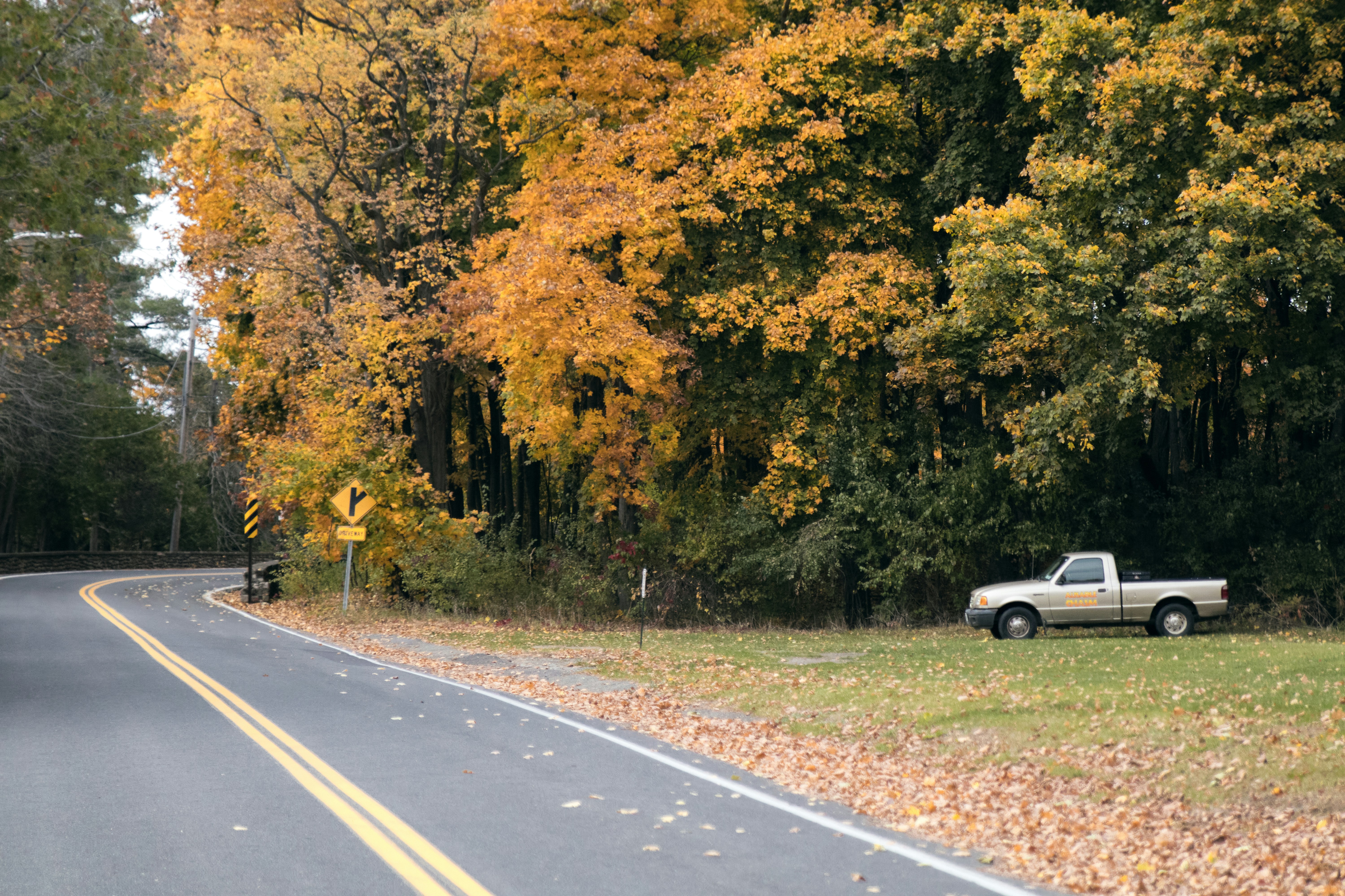 A truck is parked on the side of the road photo – Free Ausable chasm ...