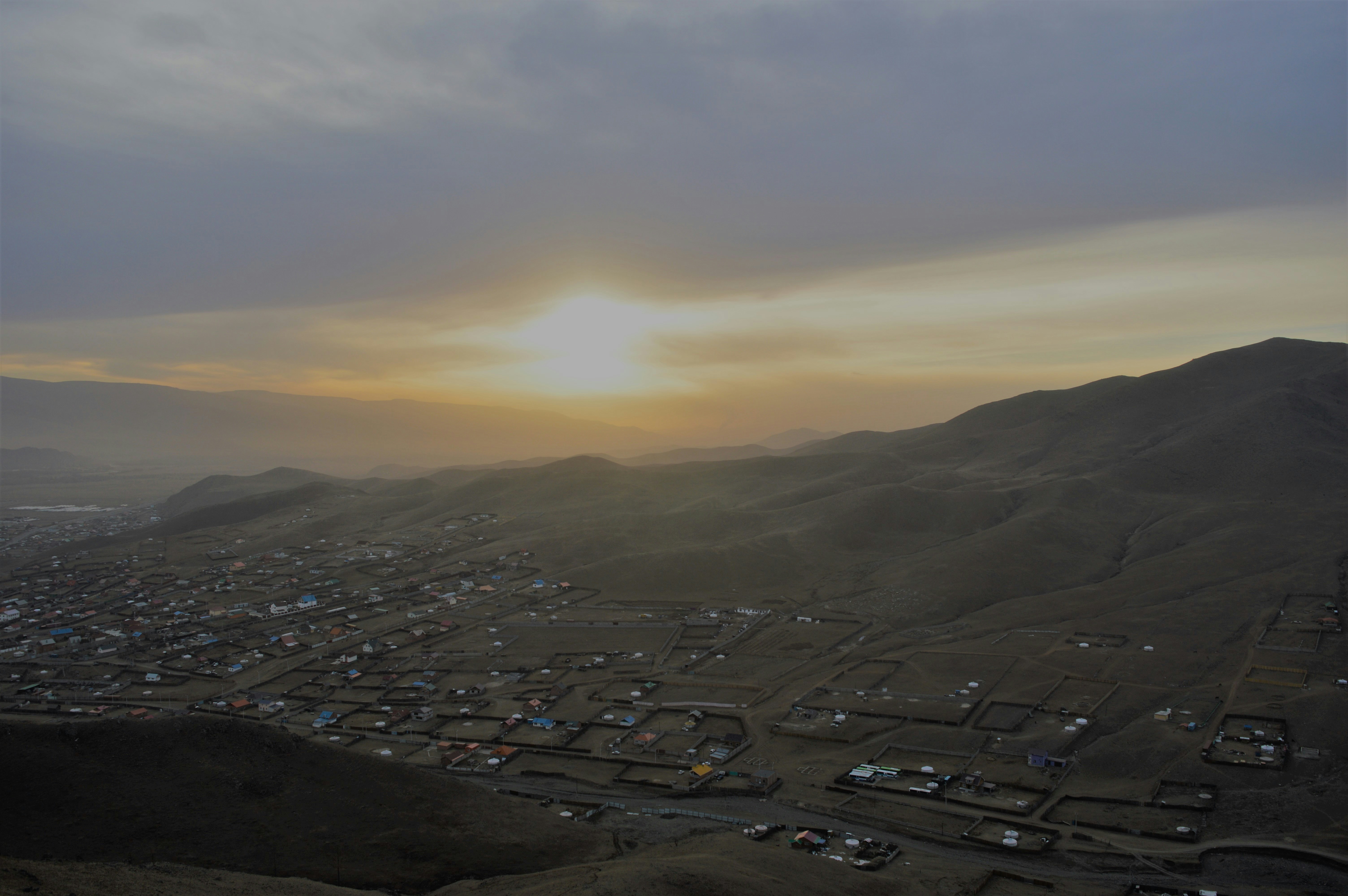 Dawn Breaks Across a Terraced Hillside Village