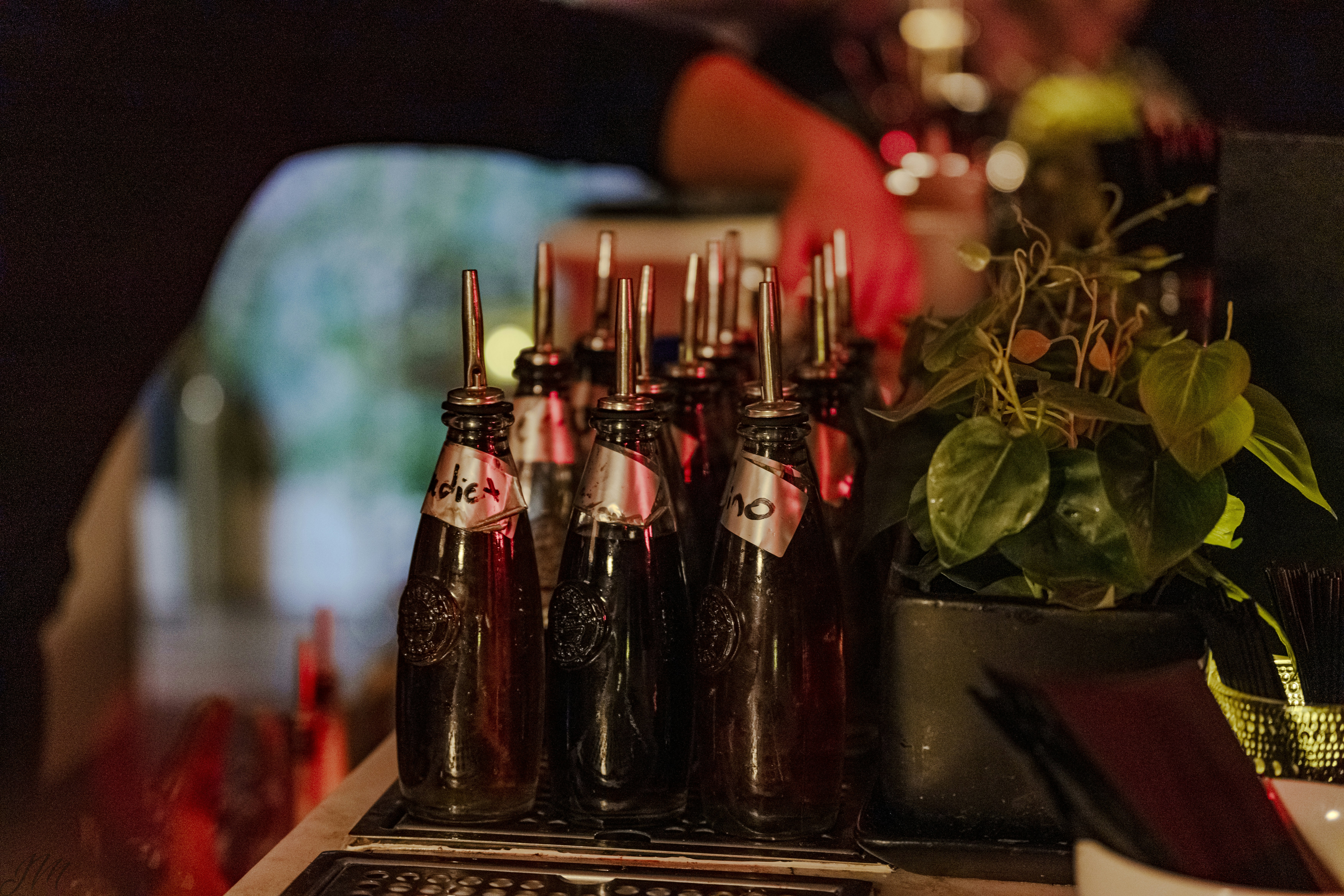 A table topped with lots of bottles of alcohol photo – Free Foxtail ...