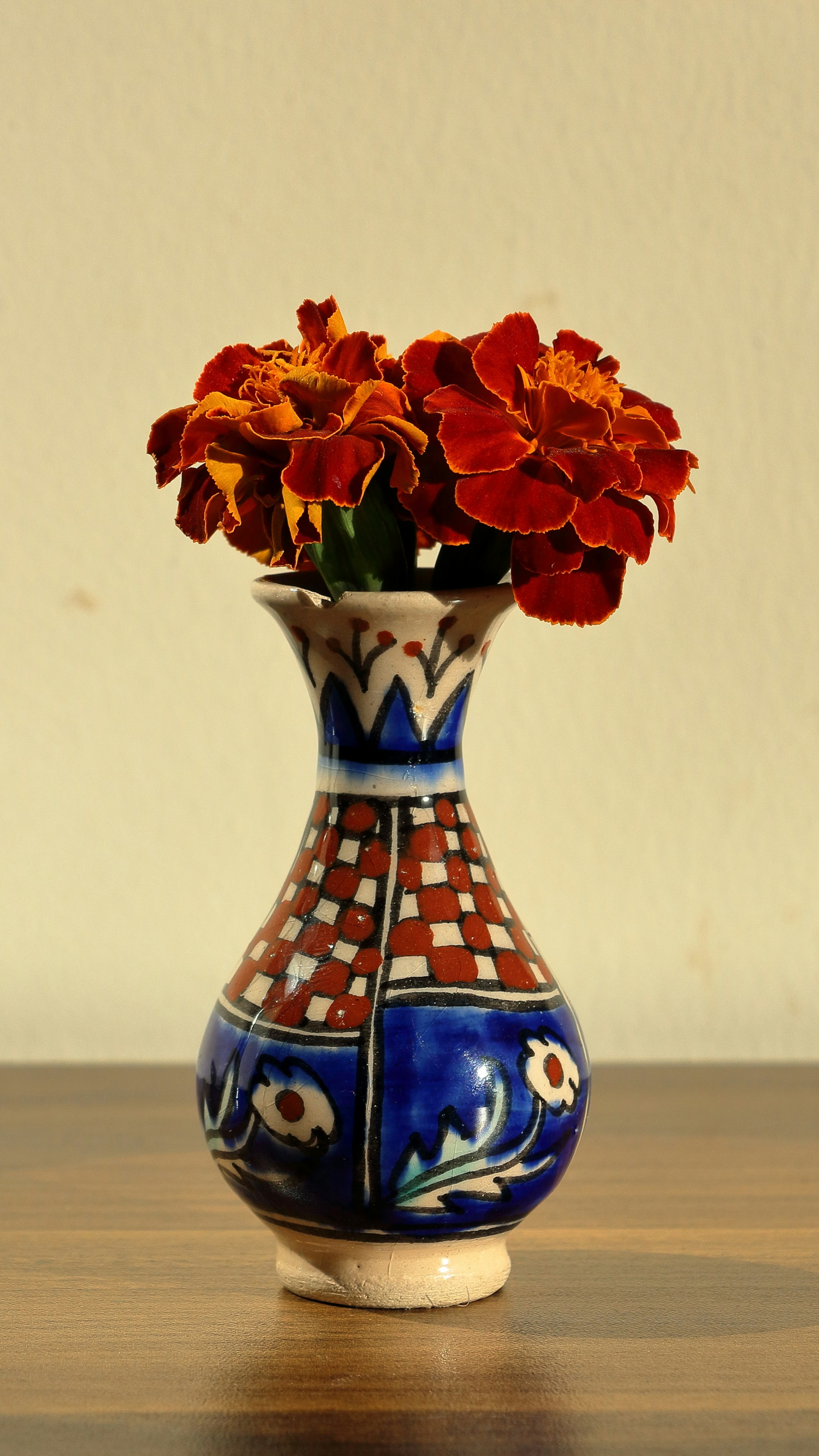 Ember Blooms in a Geometric Vase