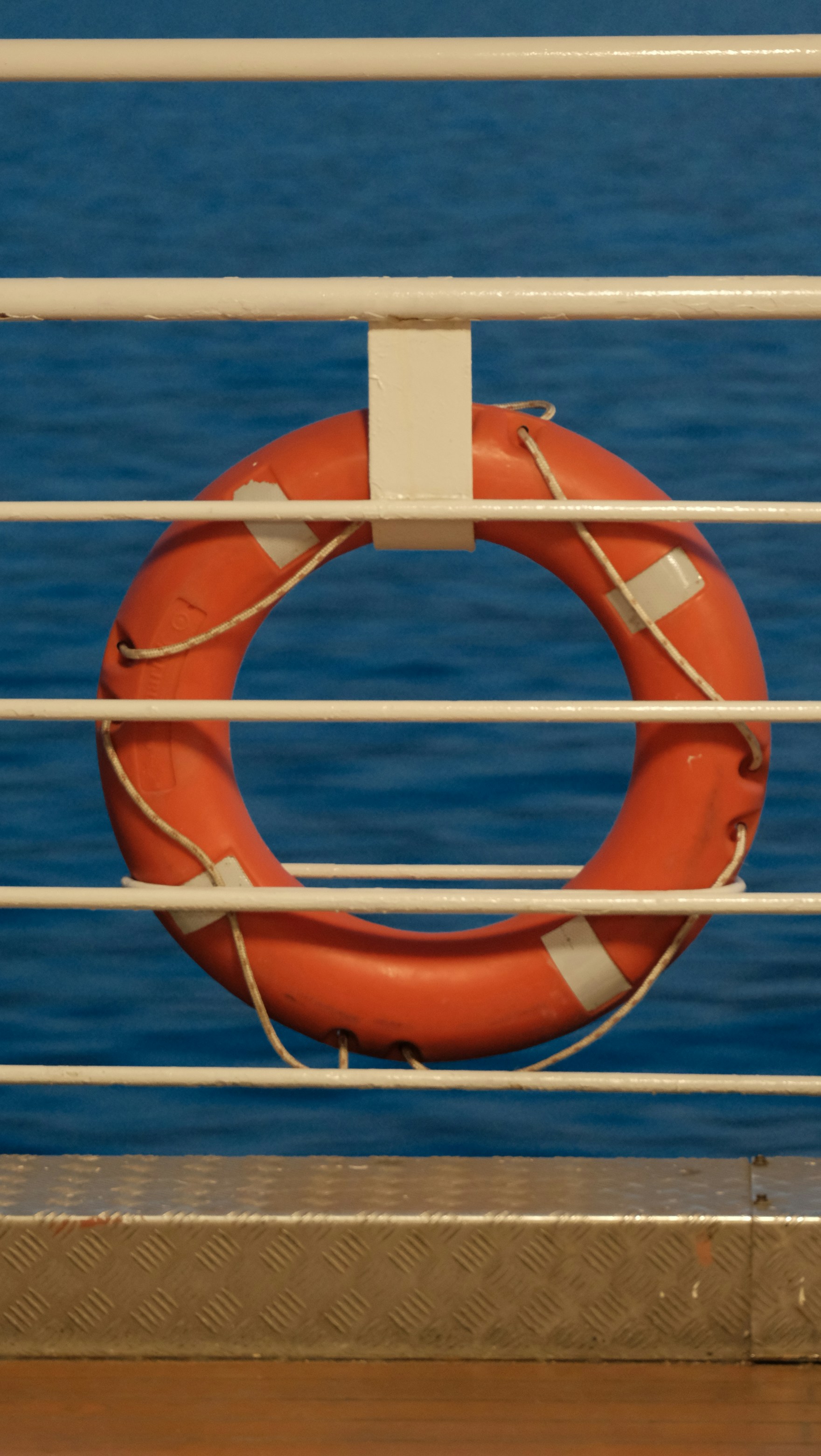 A life preserver hanging on the side of a boat photo – Free Boat Image ...