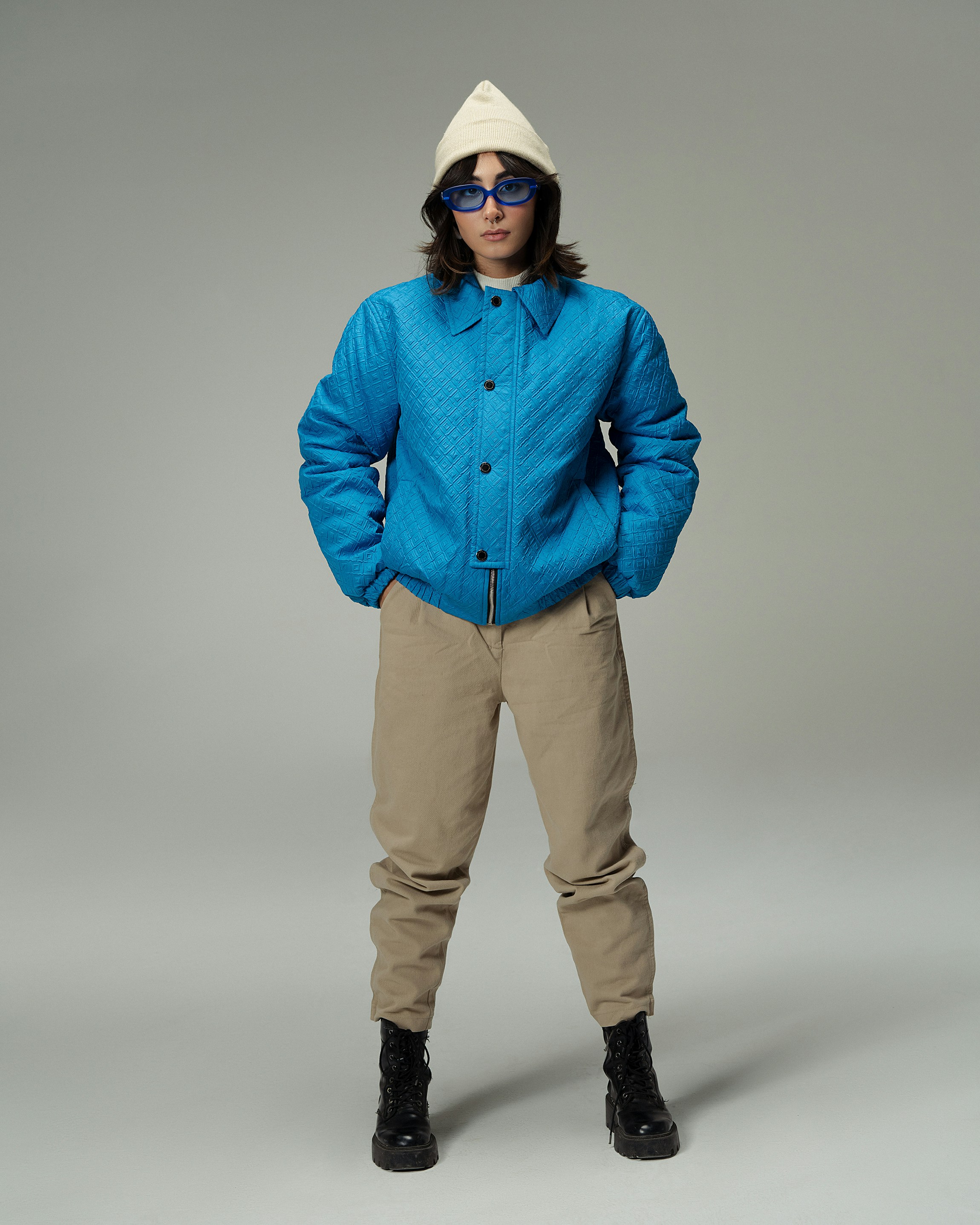 Cobalt Quilted Confidence: A Studio Portrait in Blues