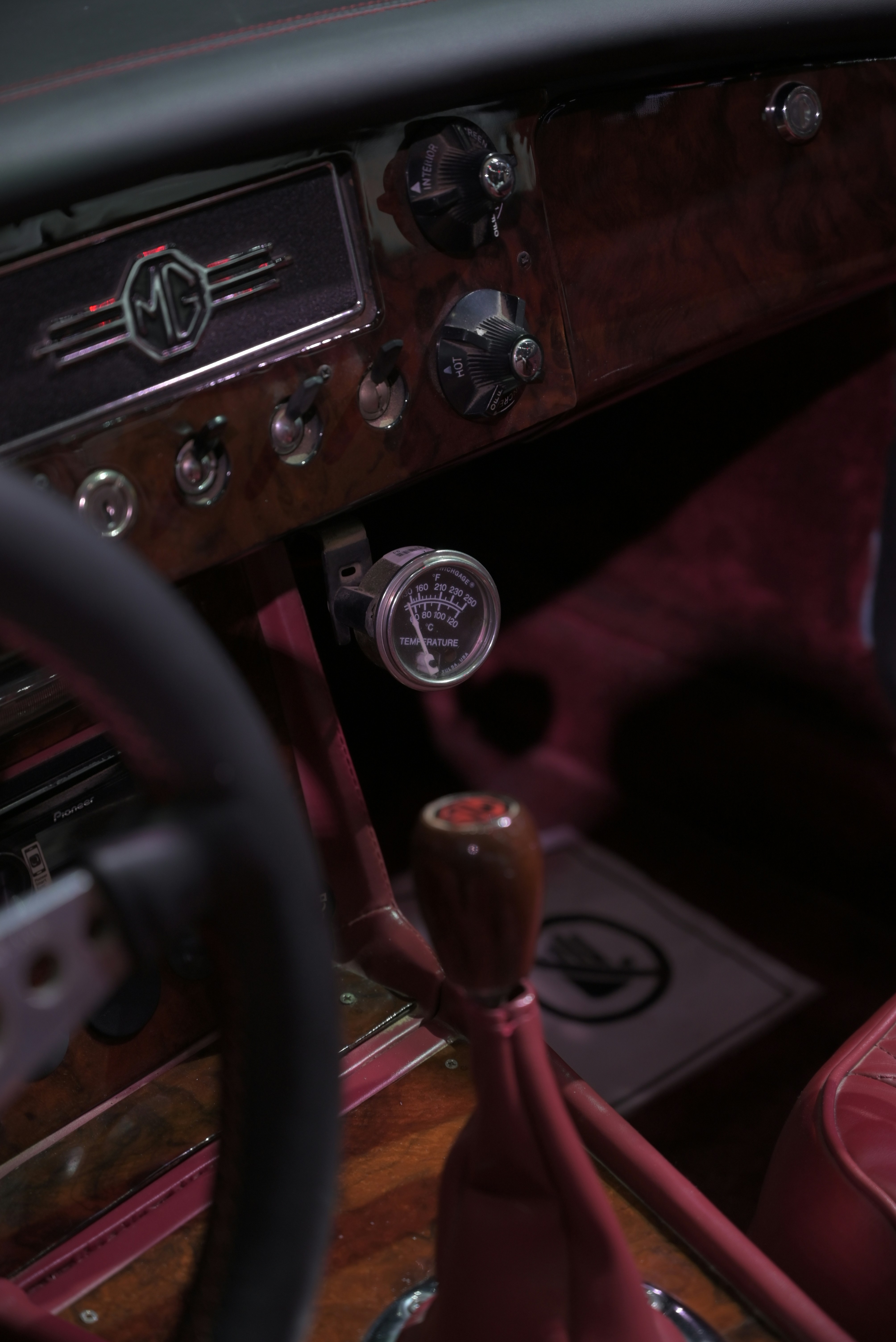 Amber Glass and Chrome: A Vintage MG Cockpit in Focus