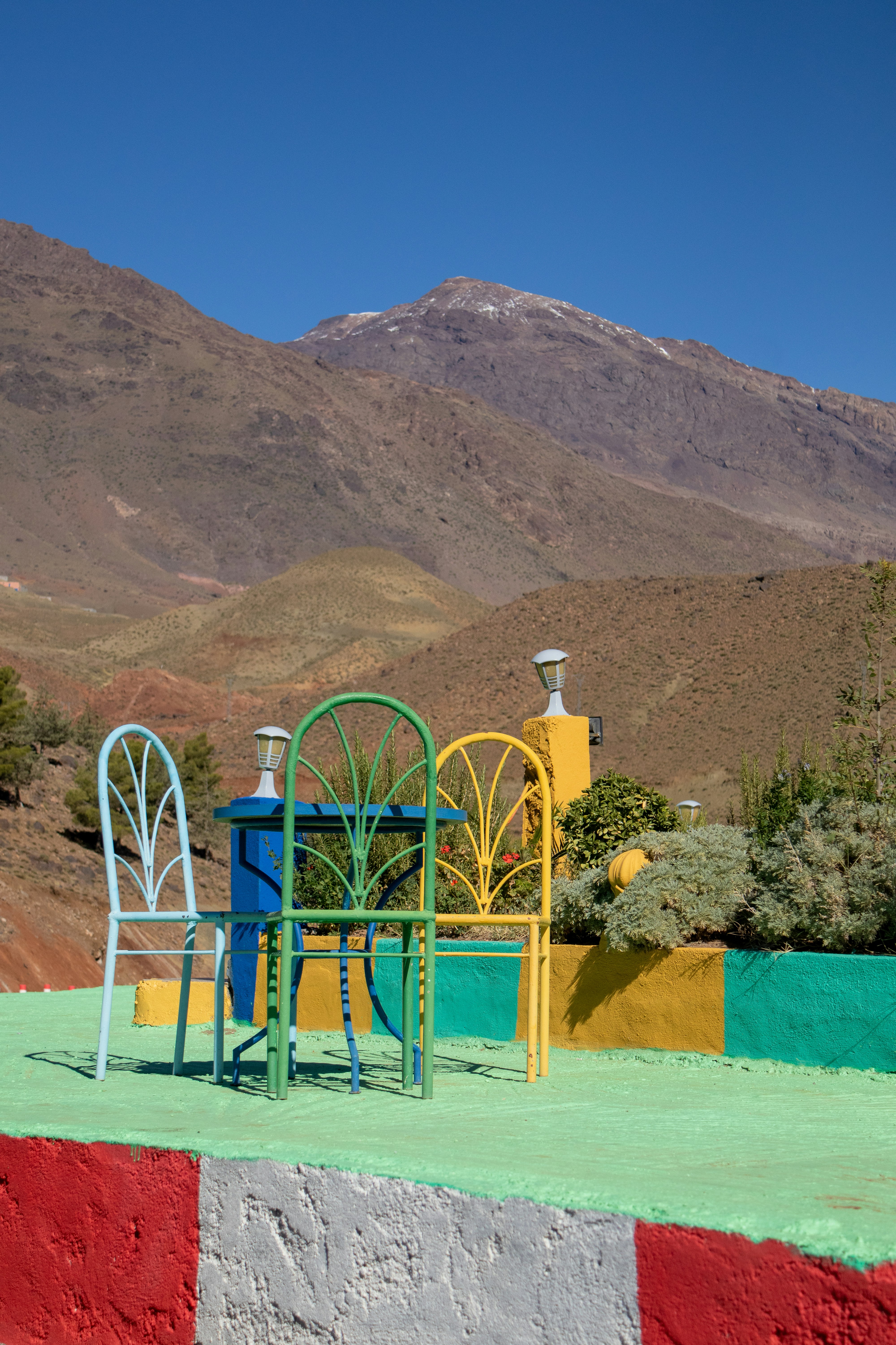 Colorful Chairs Against a Mountain Vista