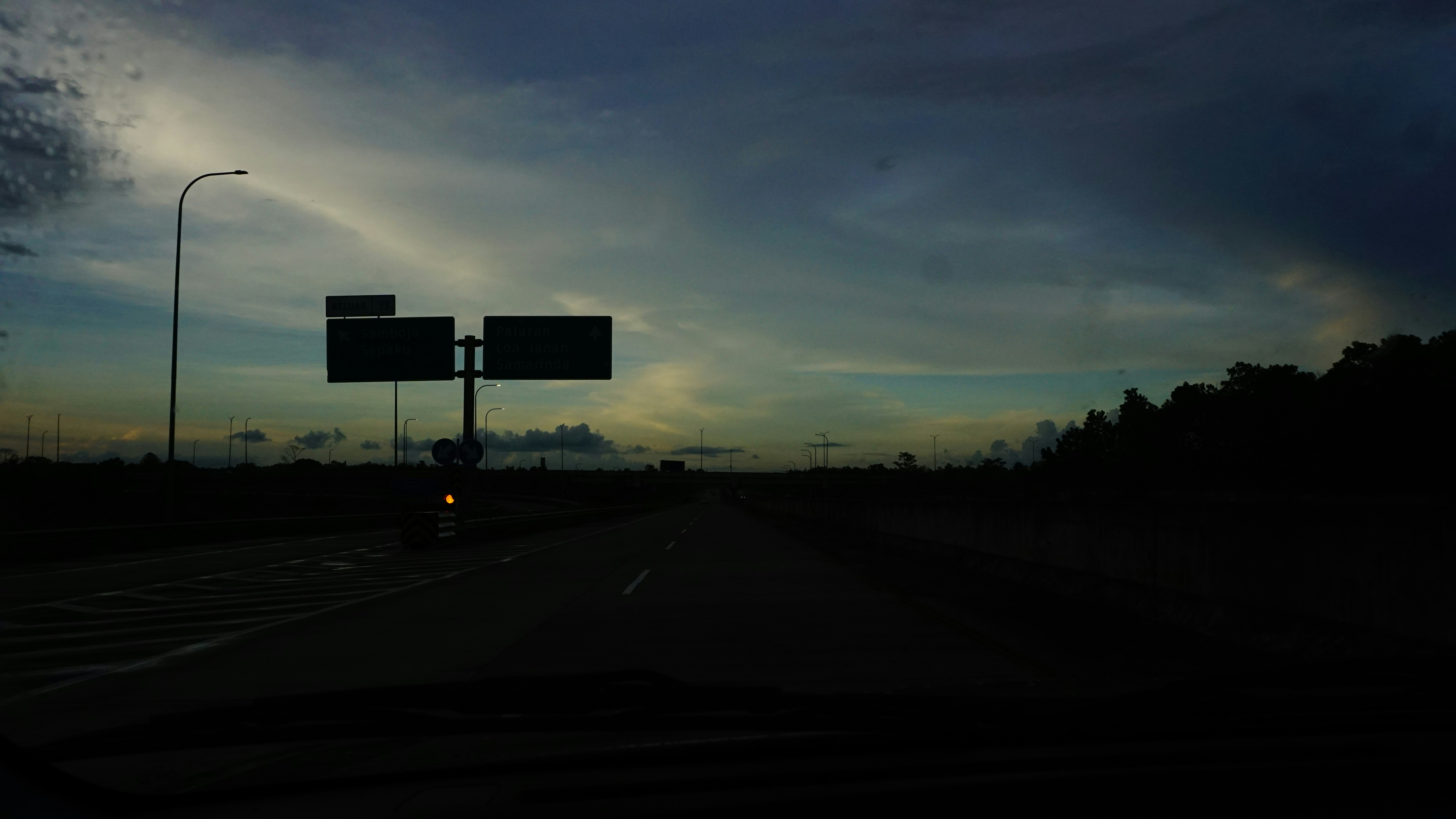Dusk on the Open Highway: Silhouettes and the Vanishing Horizon