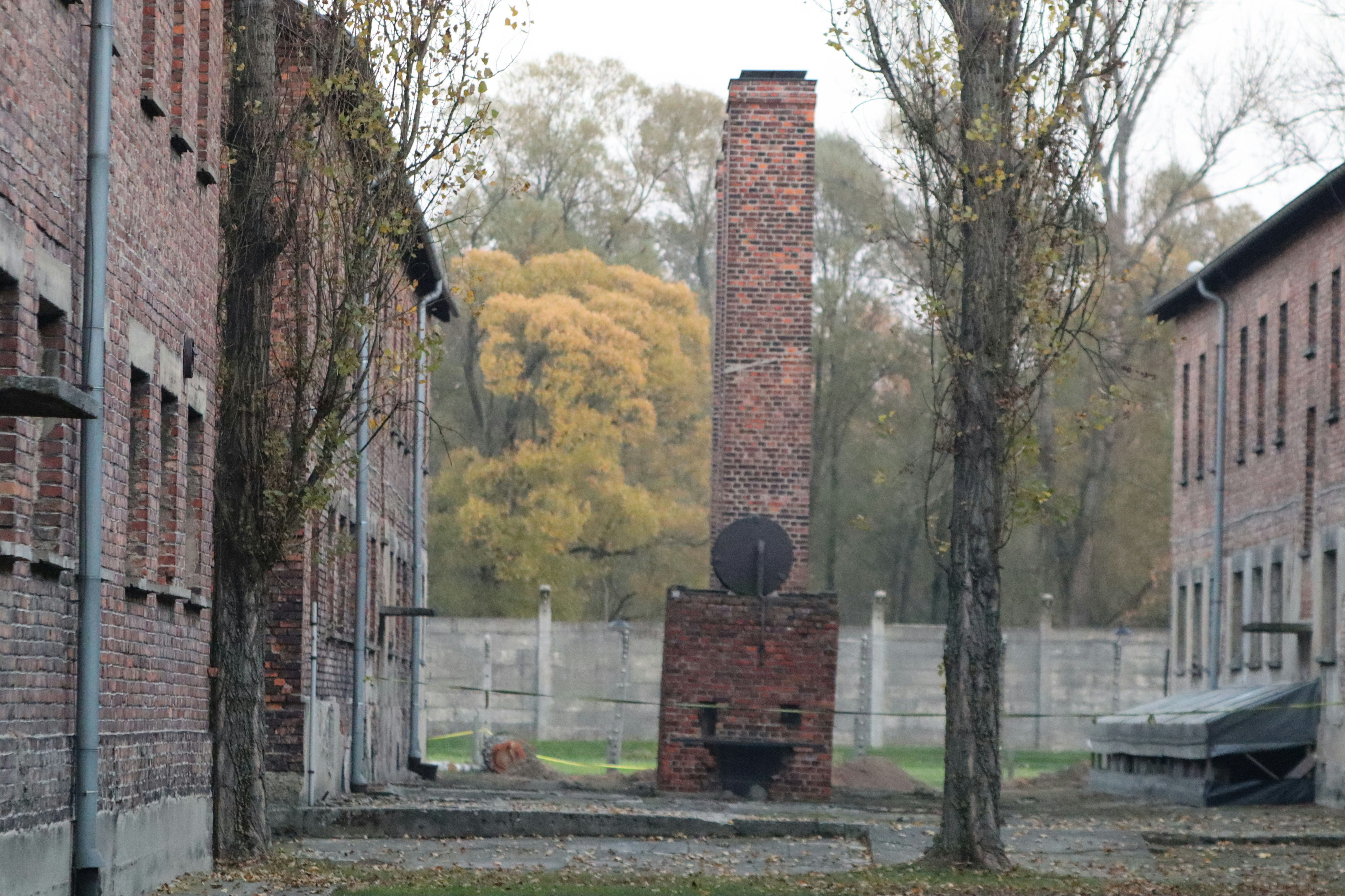 A brick building with a fire place in the middle of it photo – Free ...