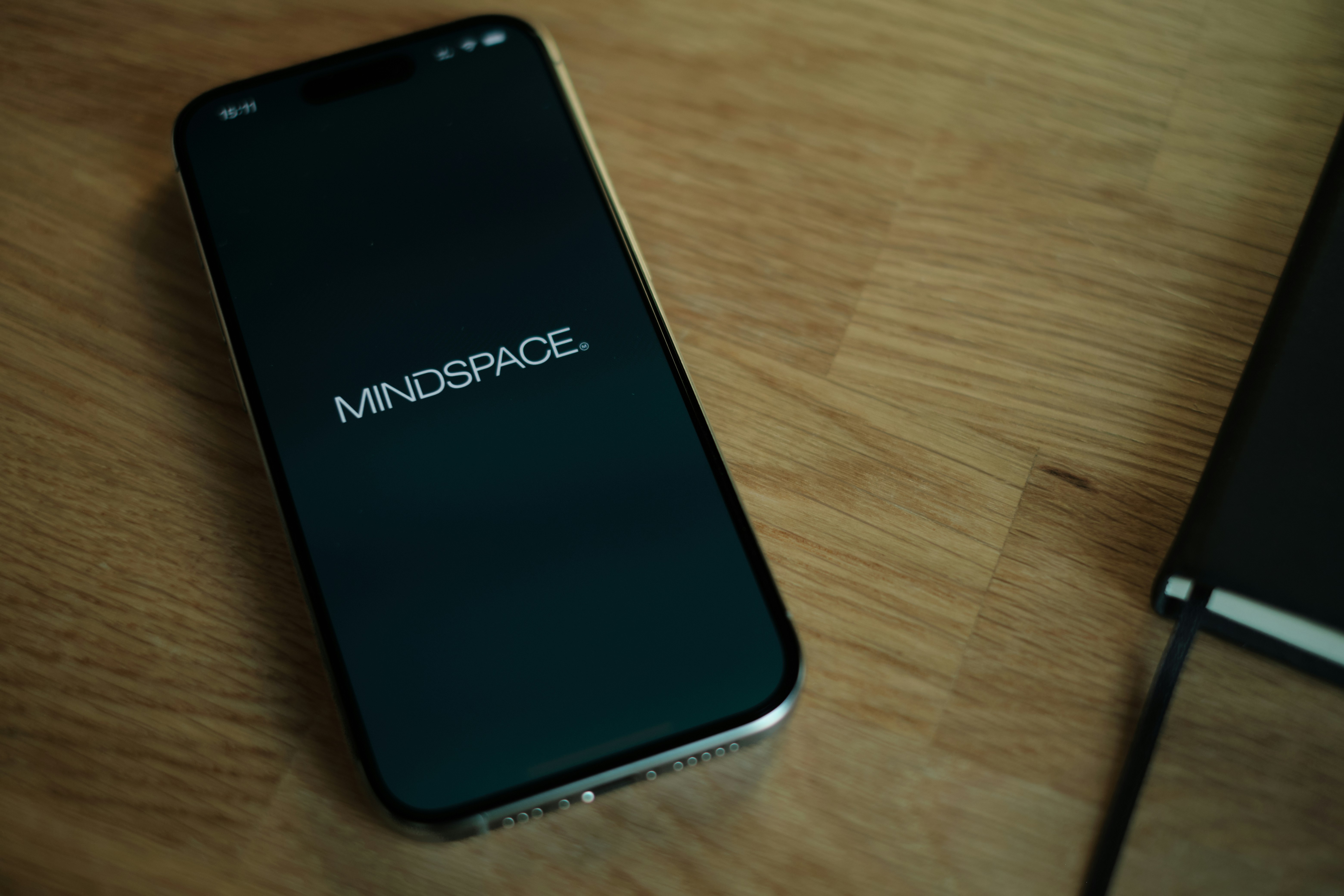 A close up of a cell phone on a table photo – Free Iphone Image on Unsplash