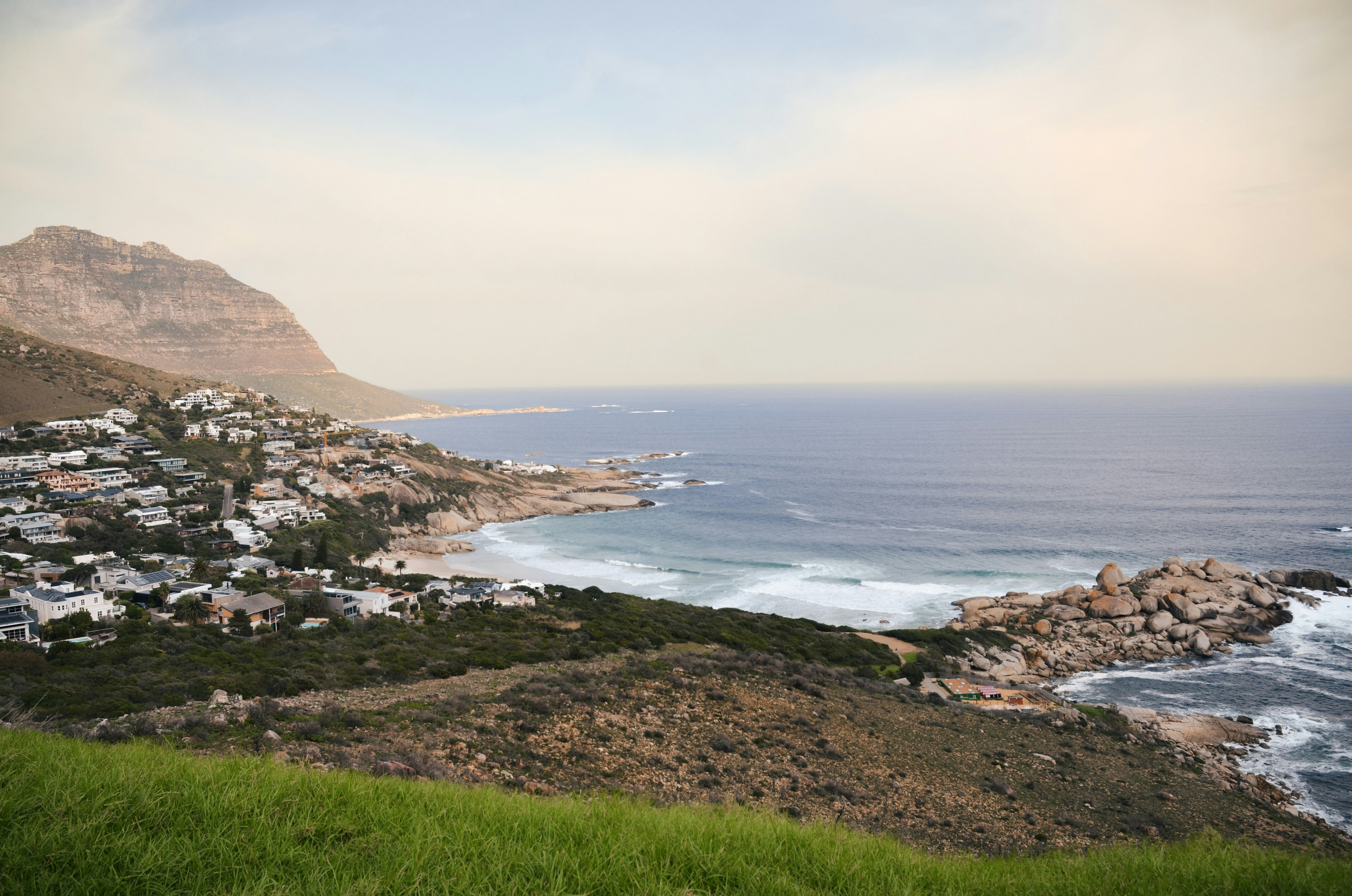 A scenic view of a town and the ocean photo – Free Cape town Image on ...