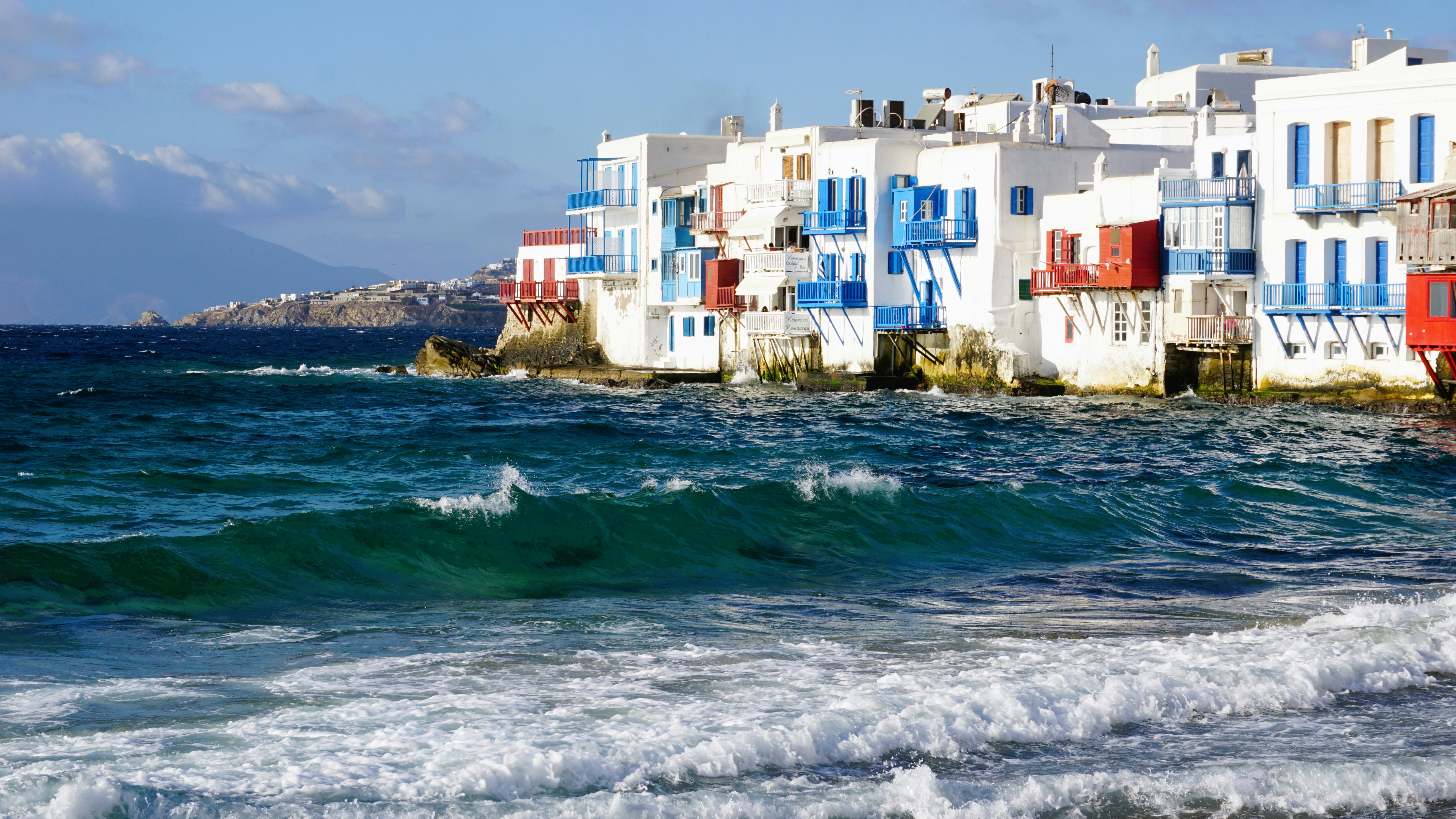 Waves Dance Along Mykonos Shores