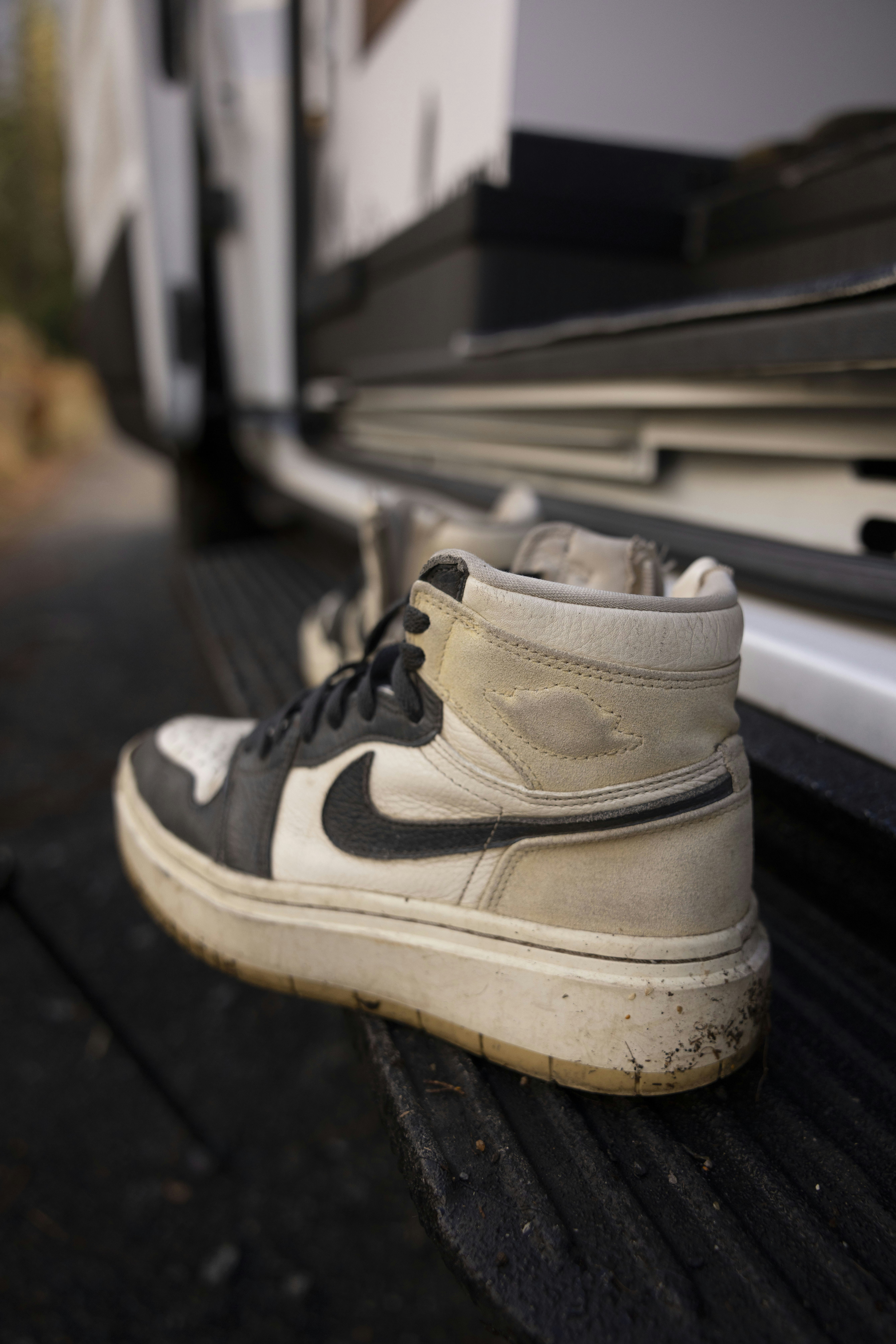 A pair of shoes sitting on top of a grill photo – Free Shoe Image on ...