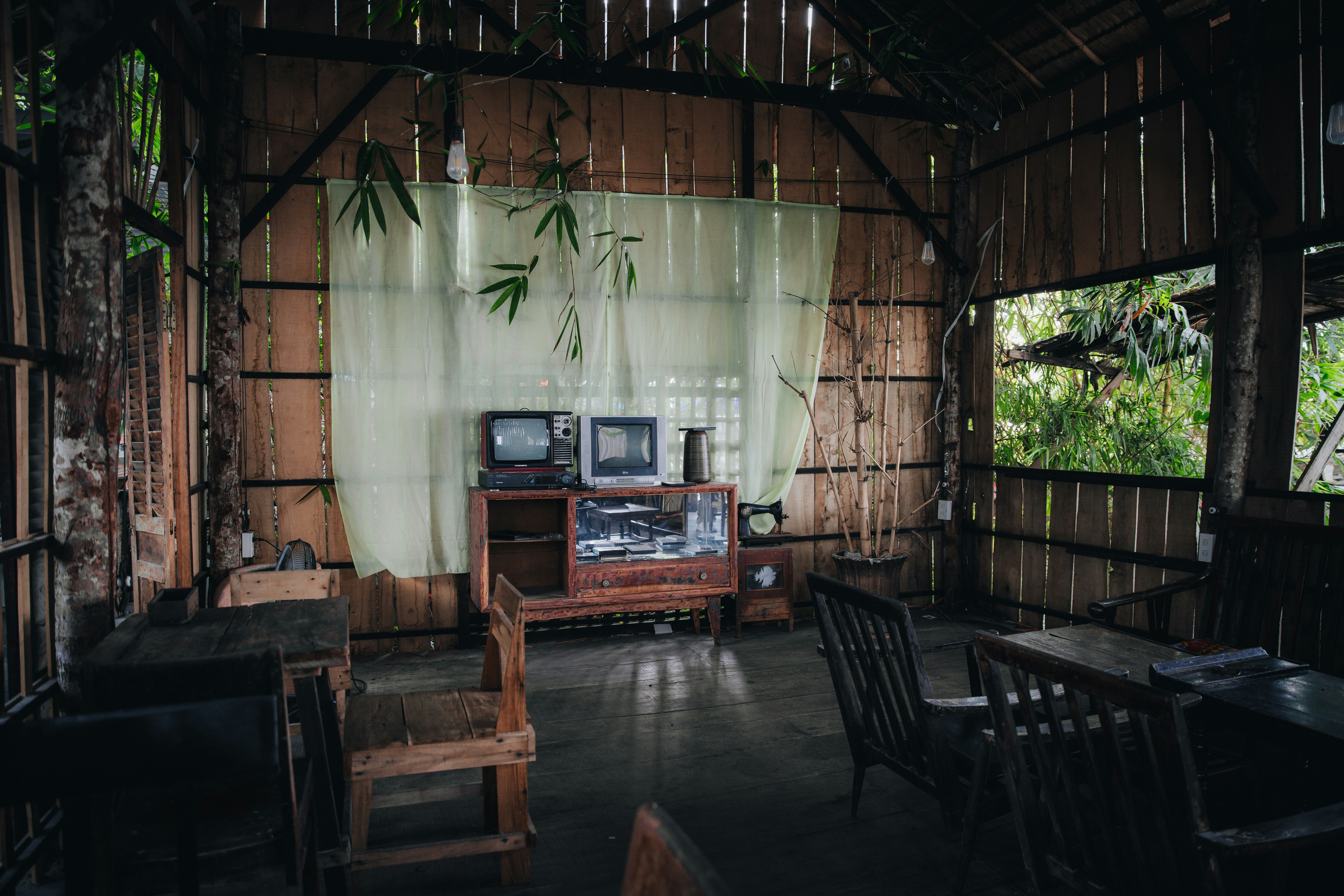 Twin CRTs in a Bamboo Hut: Soft Light Through a Green Curtain