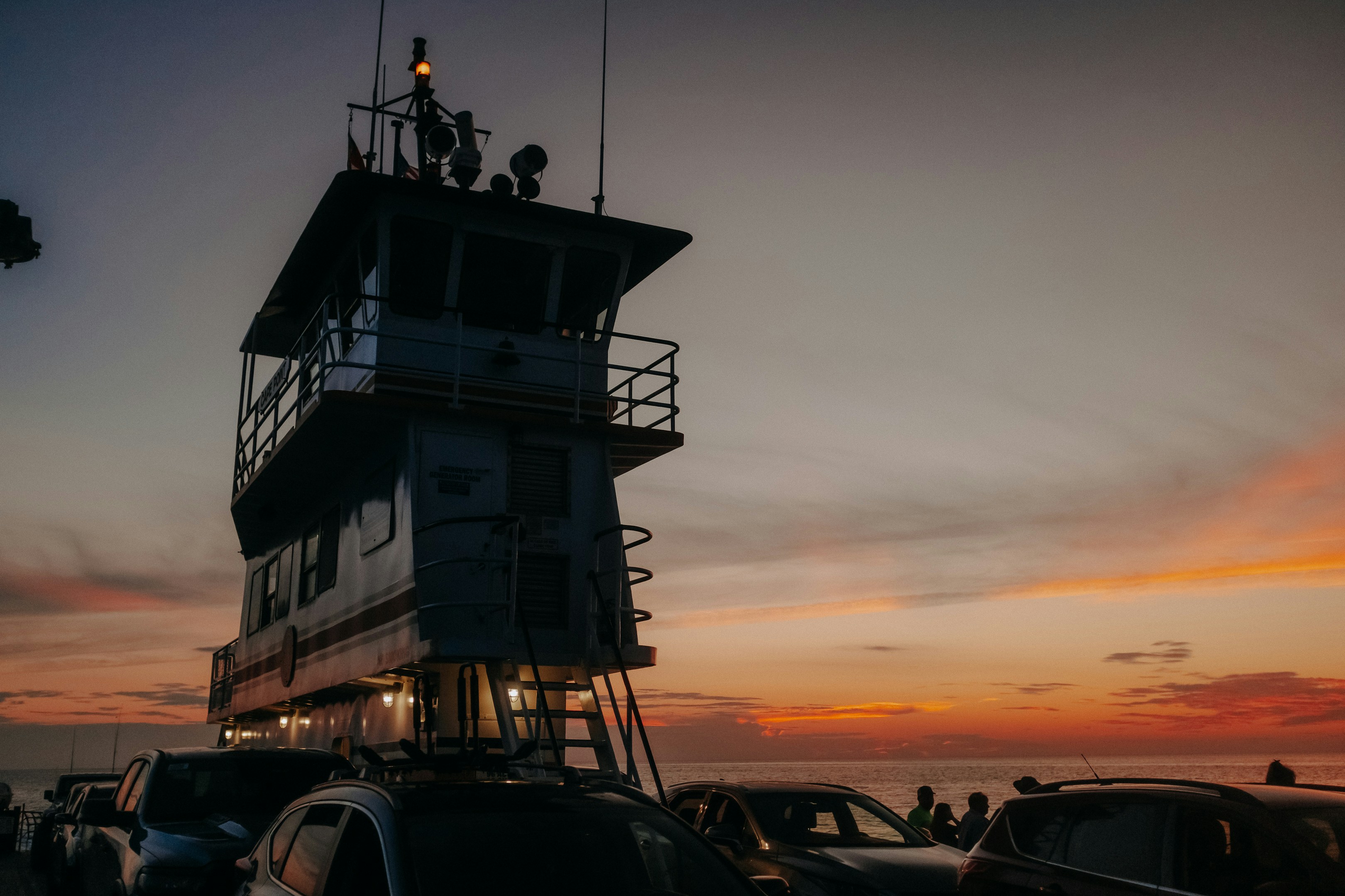 Dusk Watchtower Over a Quiet Parking Lot