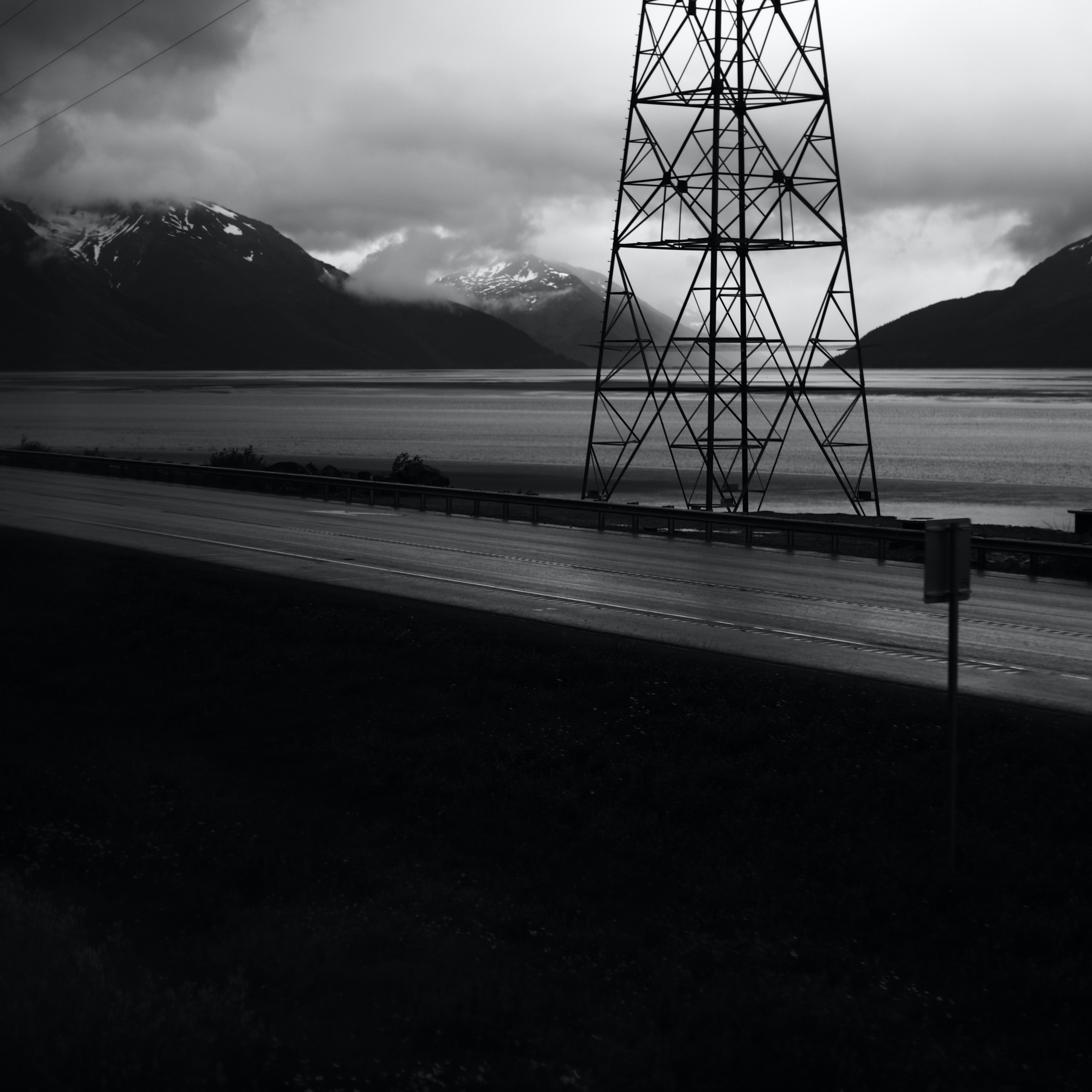 Lattice Sentinel Over a Misty Fjord