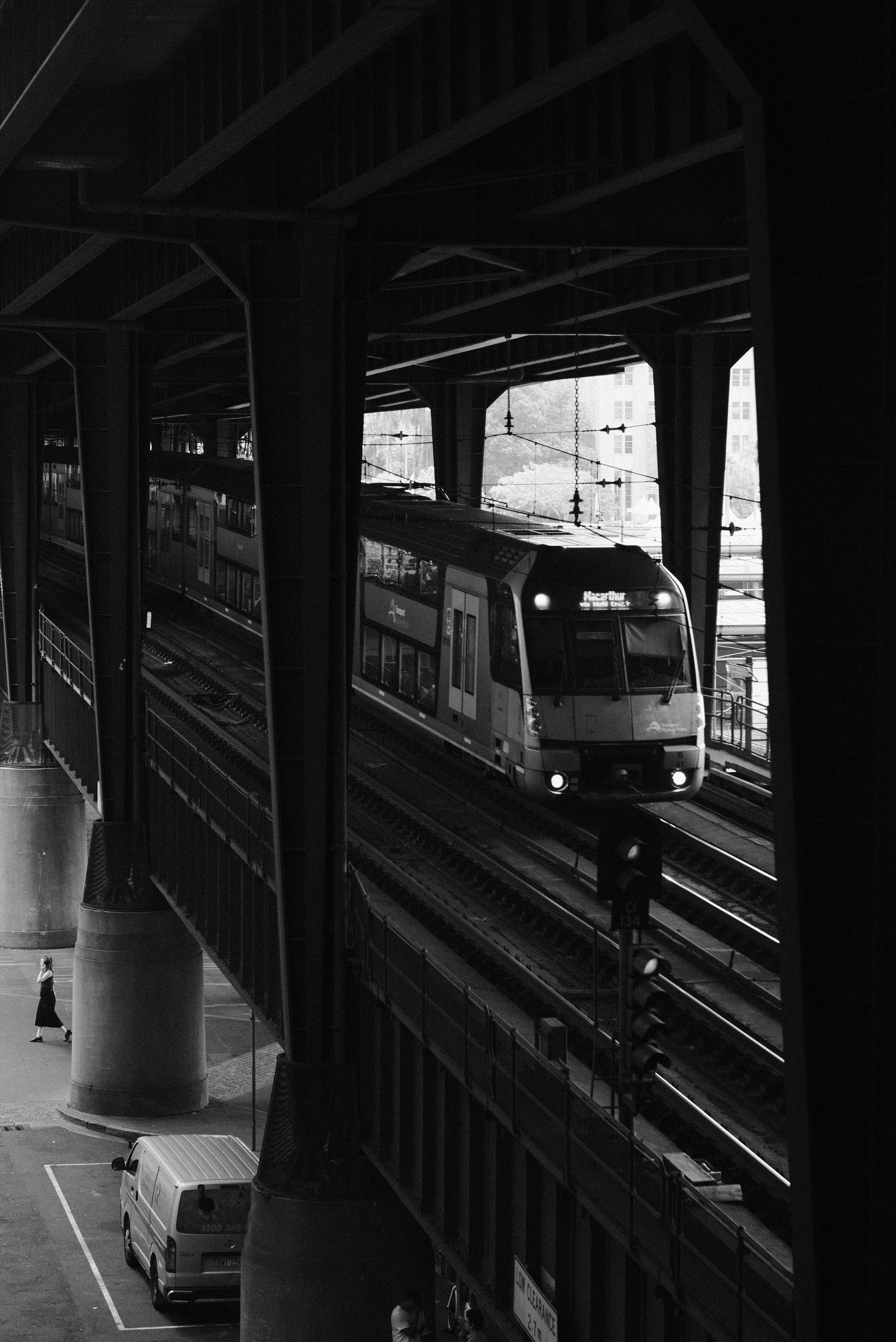 Under the Steel Canopy: A Monochrome Crossing