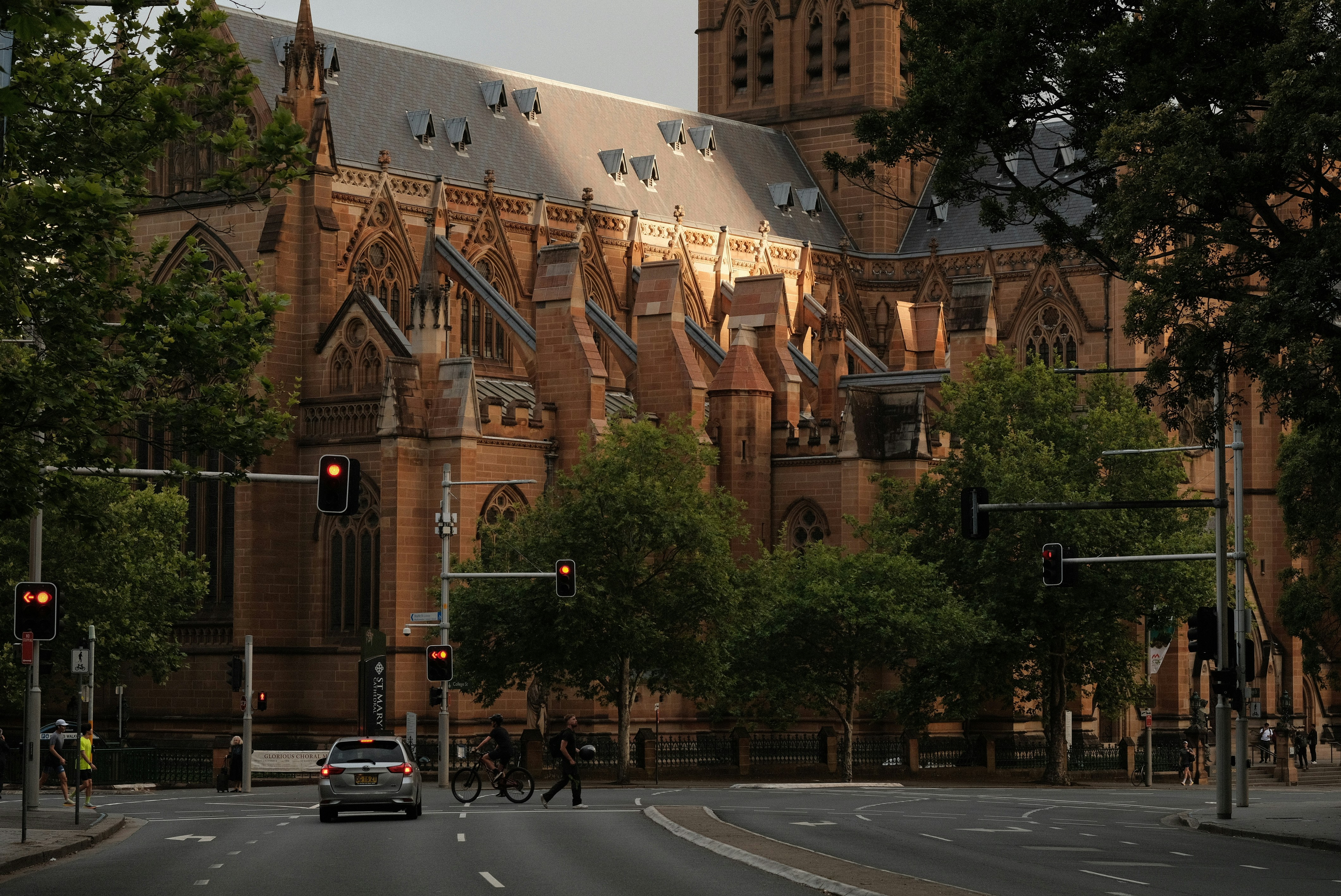 Sunlit Gothic Facade Rising Over a Quiet City Street