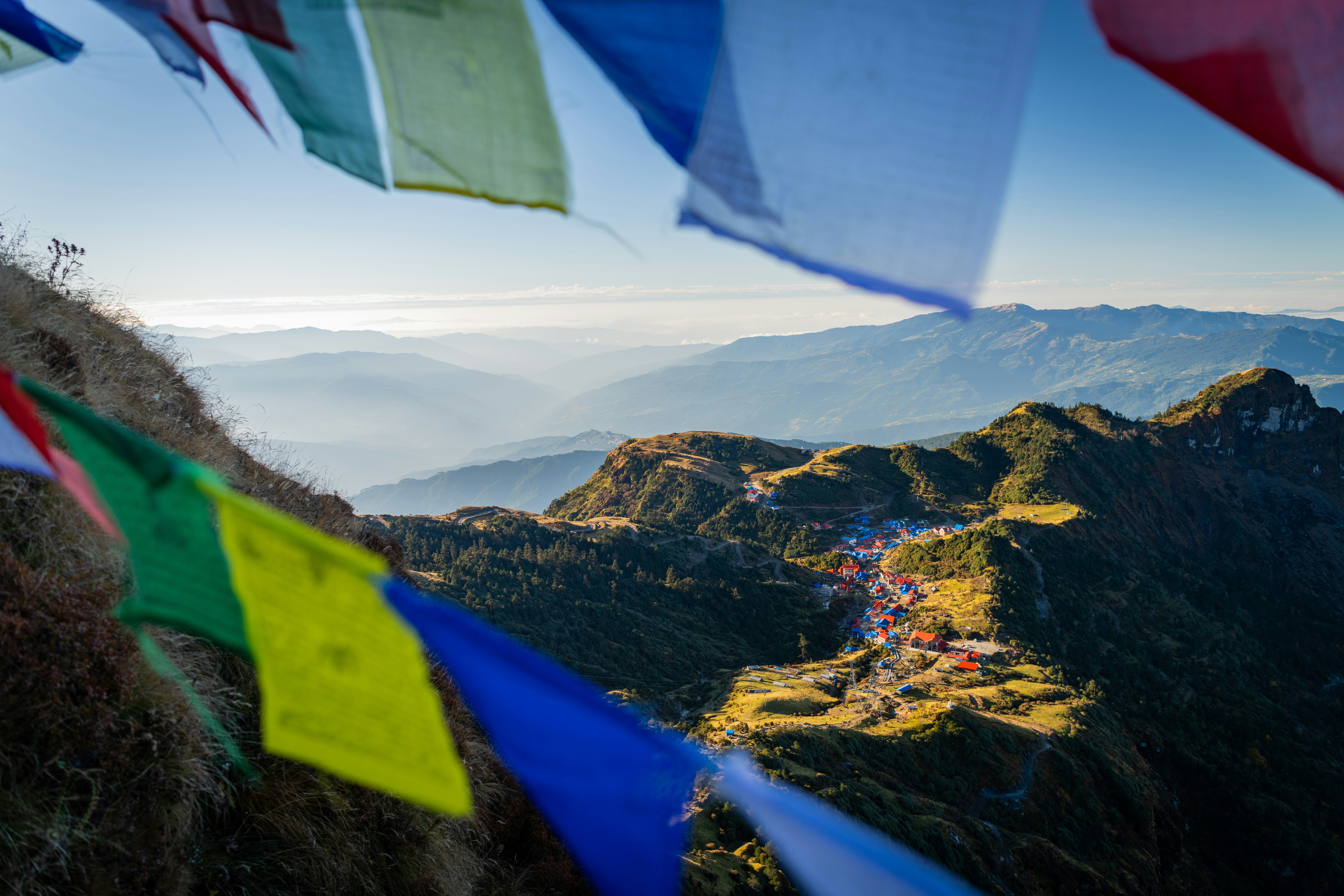 A group of colorful flags flying in the air photo – Free Nepal Image on ...