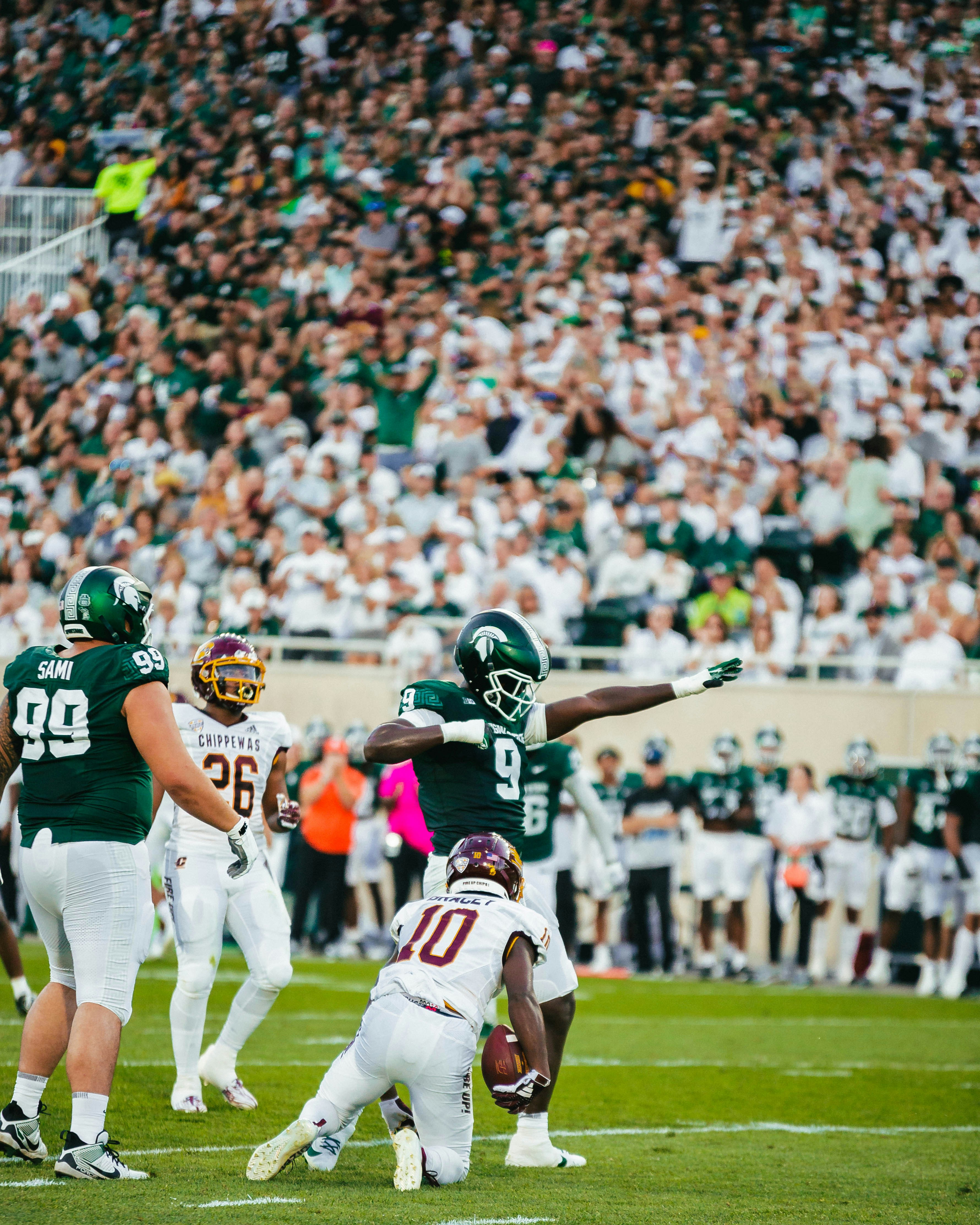Center Stage in Green: A Breakaway Halt at Midfield