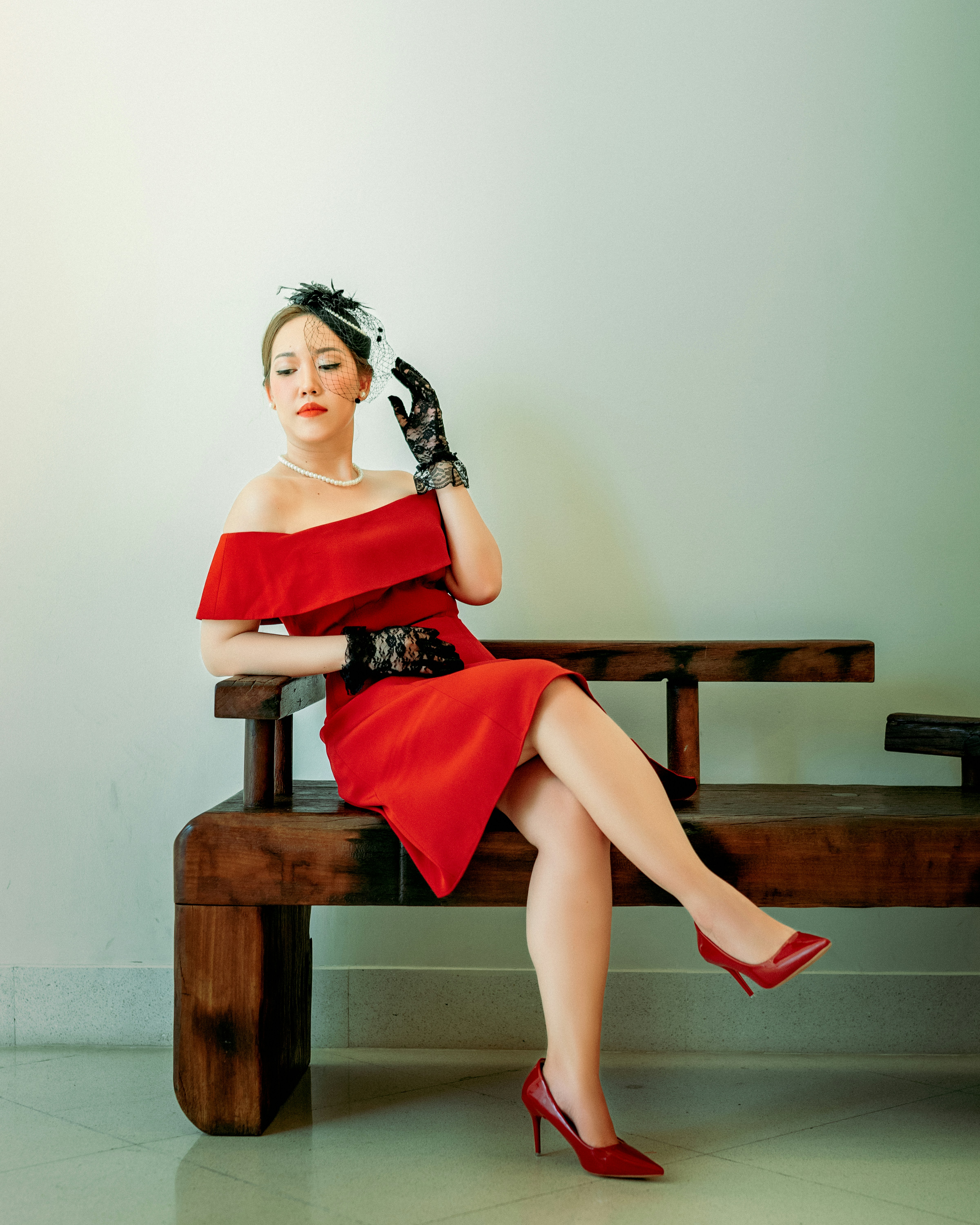 Crimson Velvet Reverie on a Weathered Bench