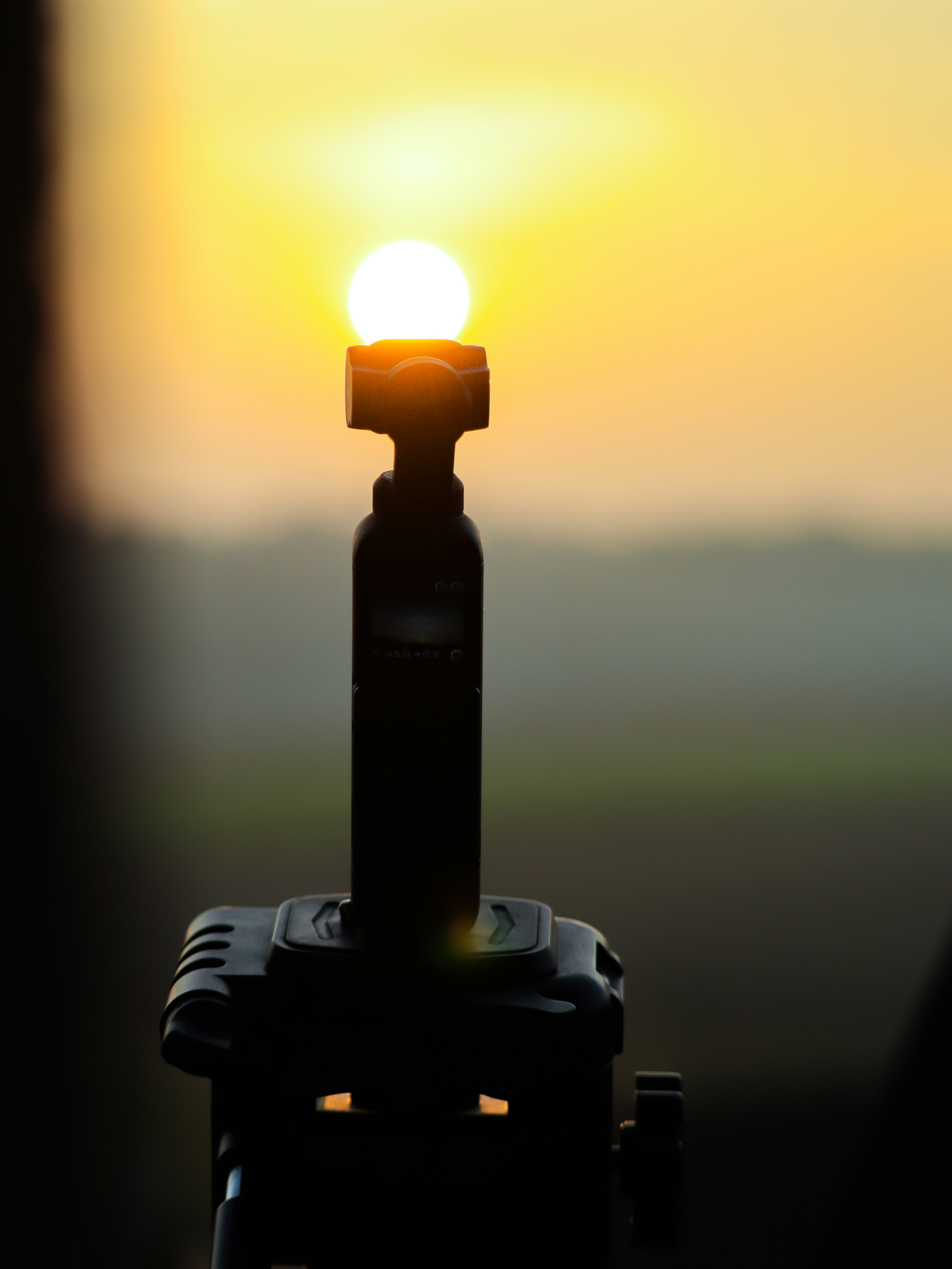 Sunlit Aperture on a Tripod: Sunrise Focus through a Hollow Core