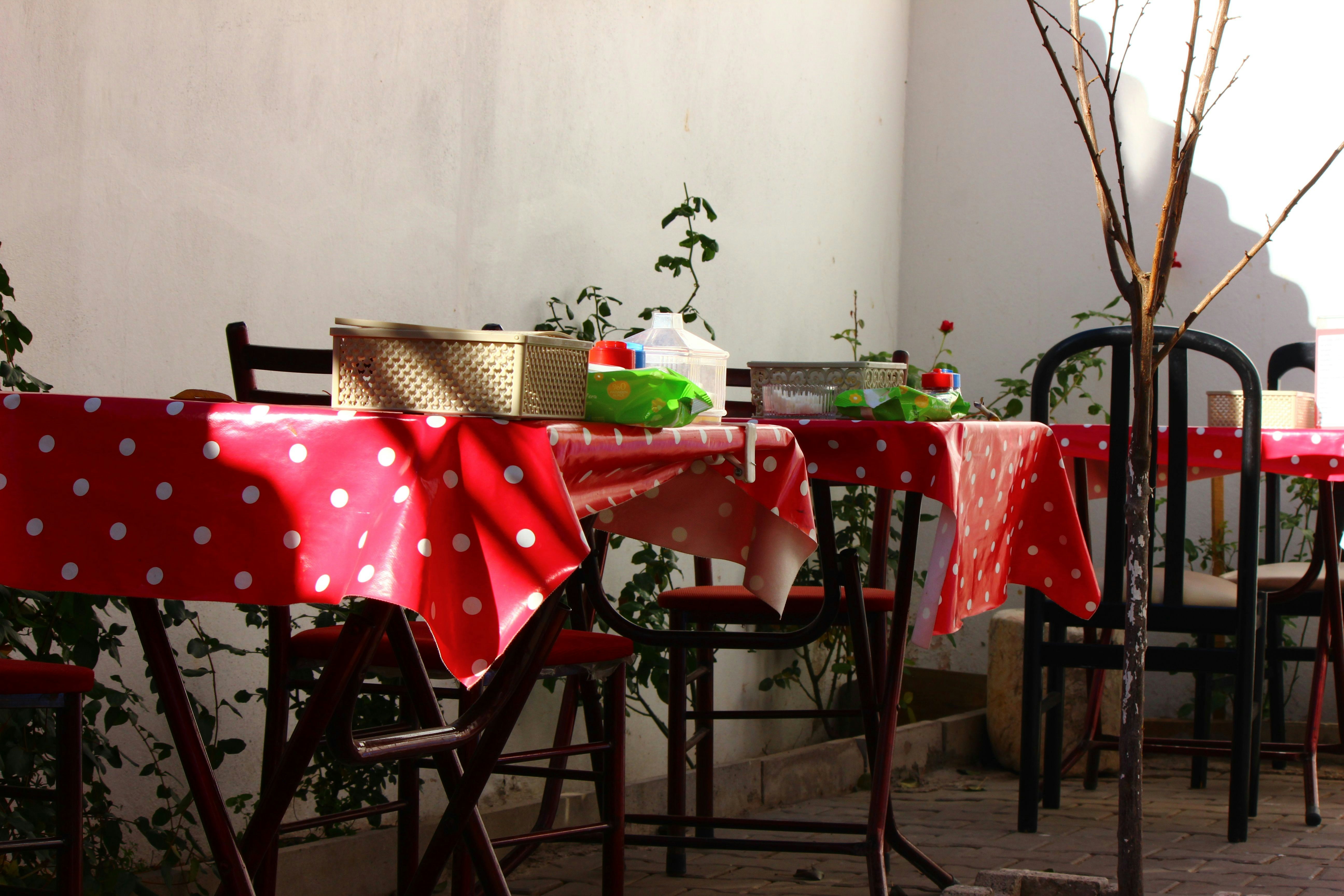 A table with a red and white polka dot table cloth photo – Free Cafe ...