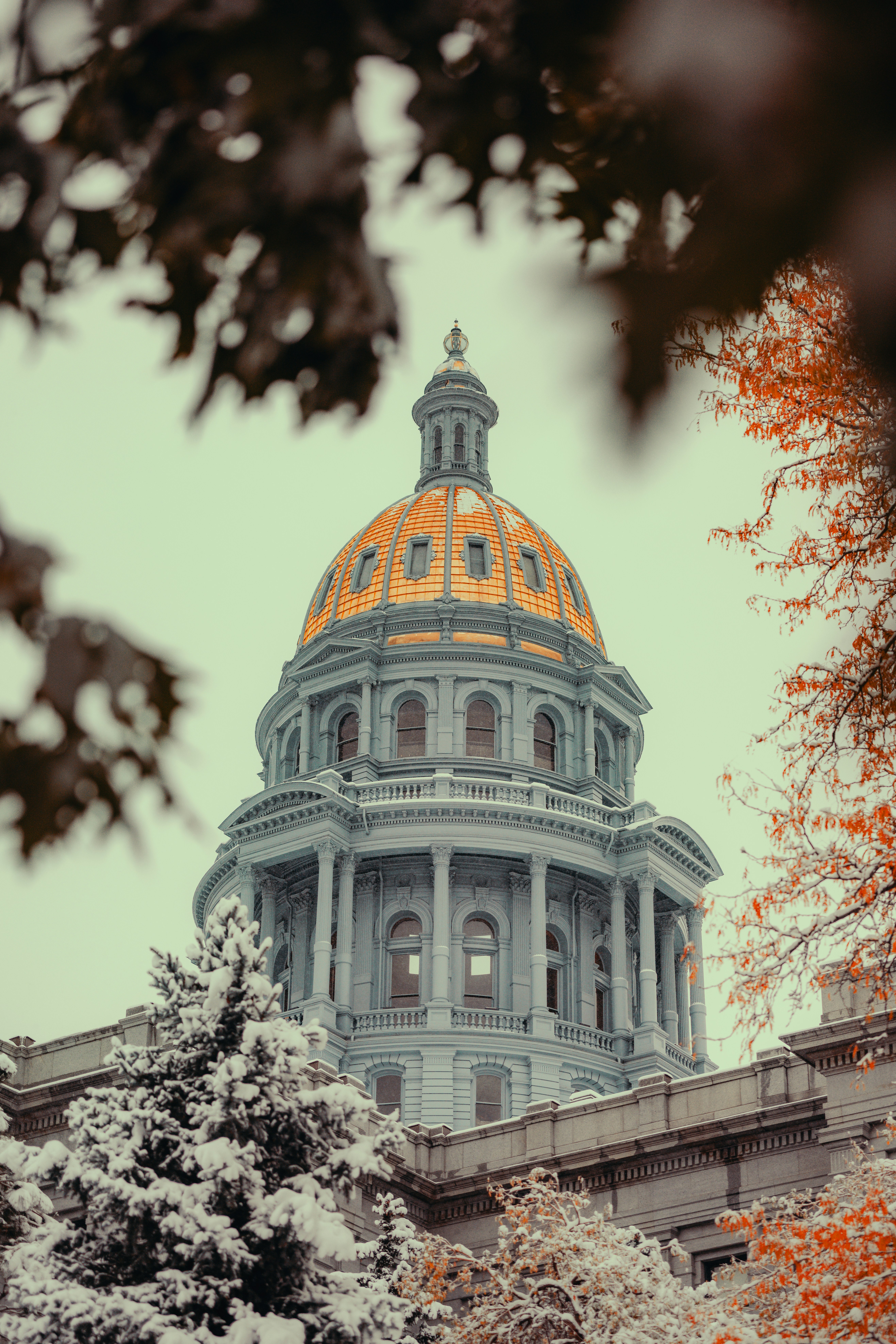 A view of the dome of the state capitol building photo – Free Snow ...