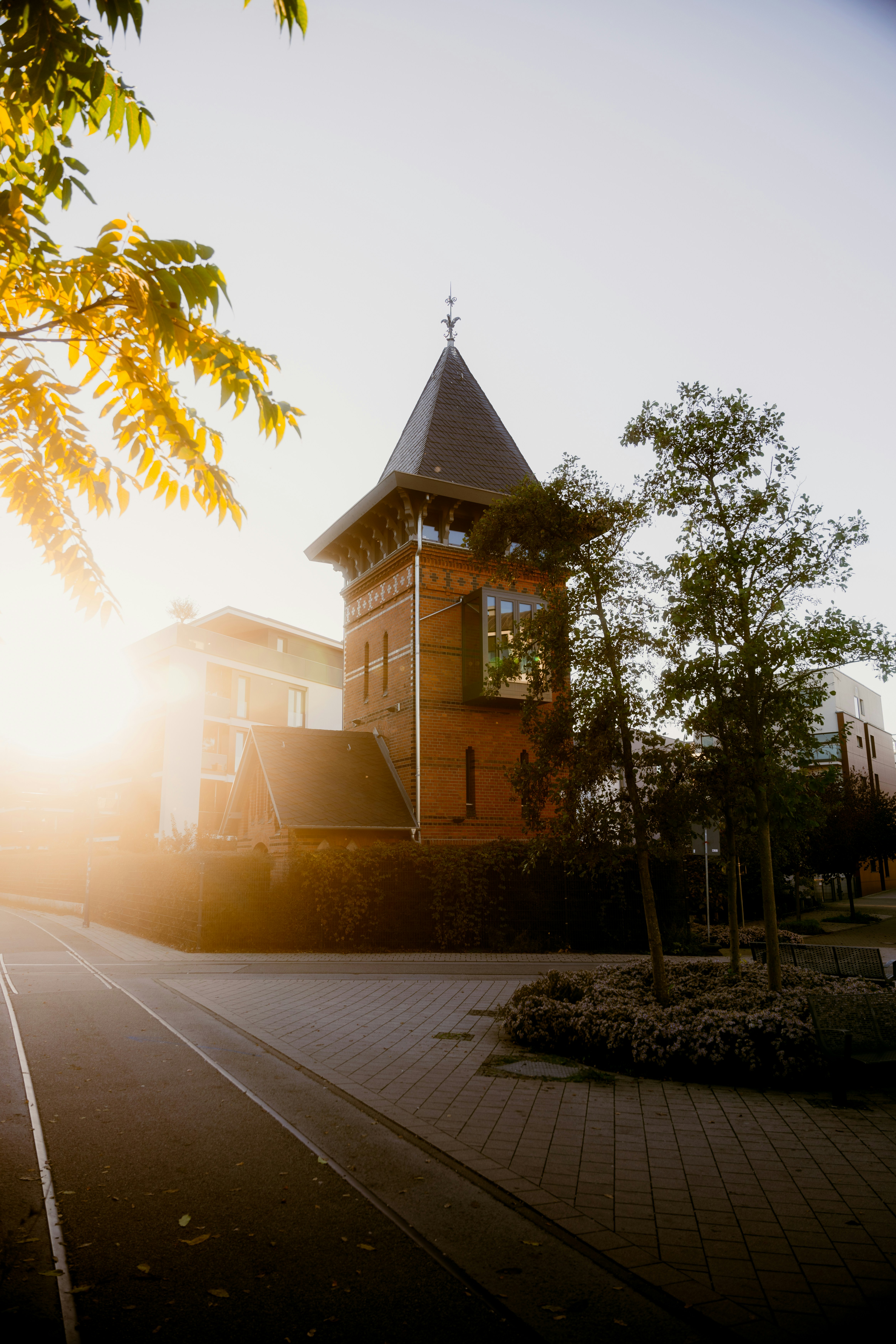 Sunlit Clocktower Among Quiet Streets