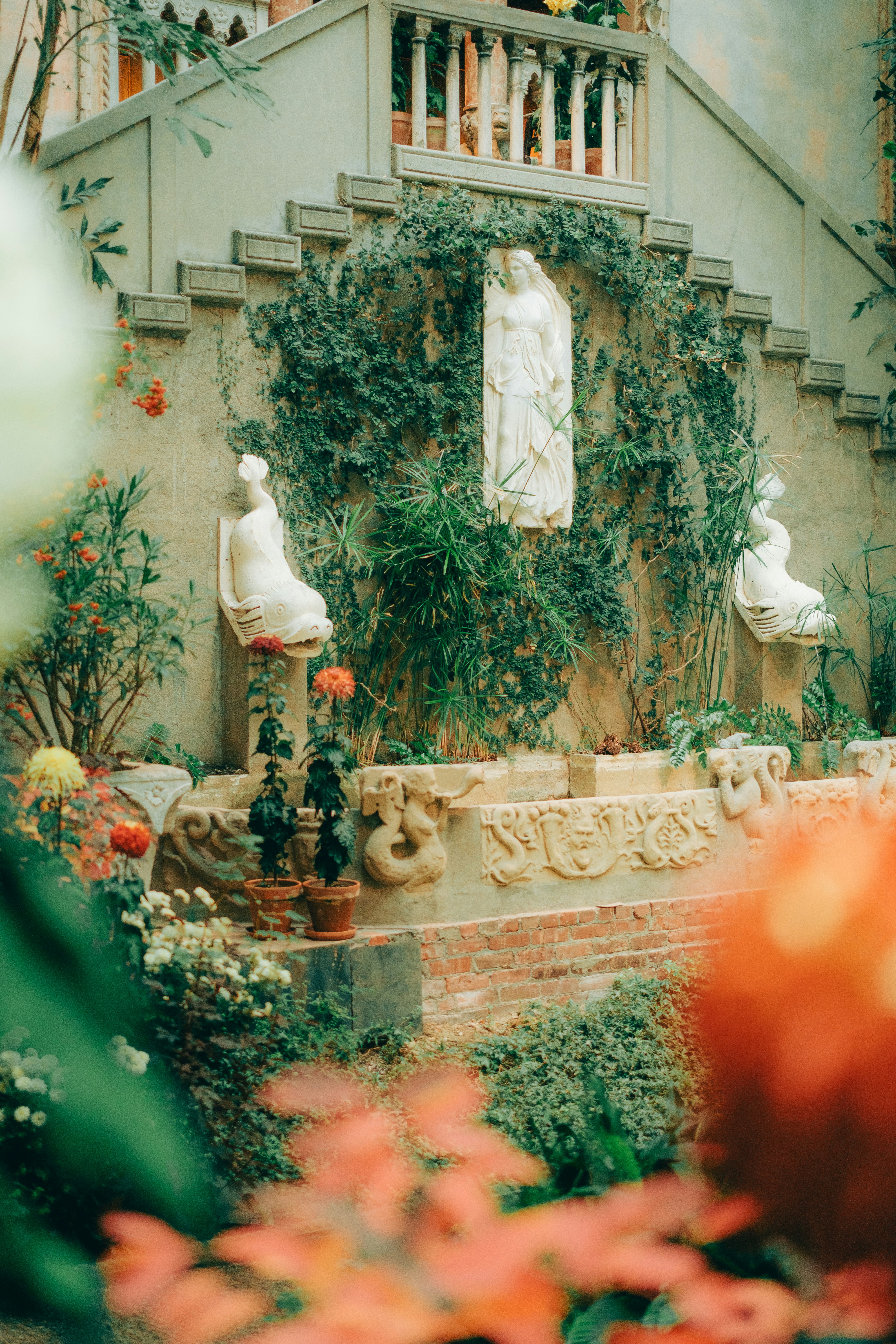 Statue Garden Reverie Amid Floral Arch and Sculpted Fountains