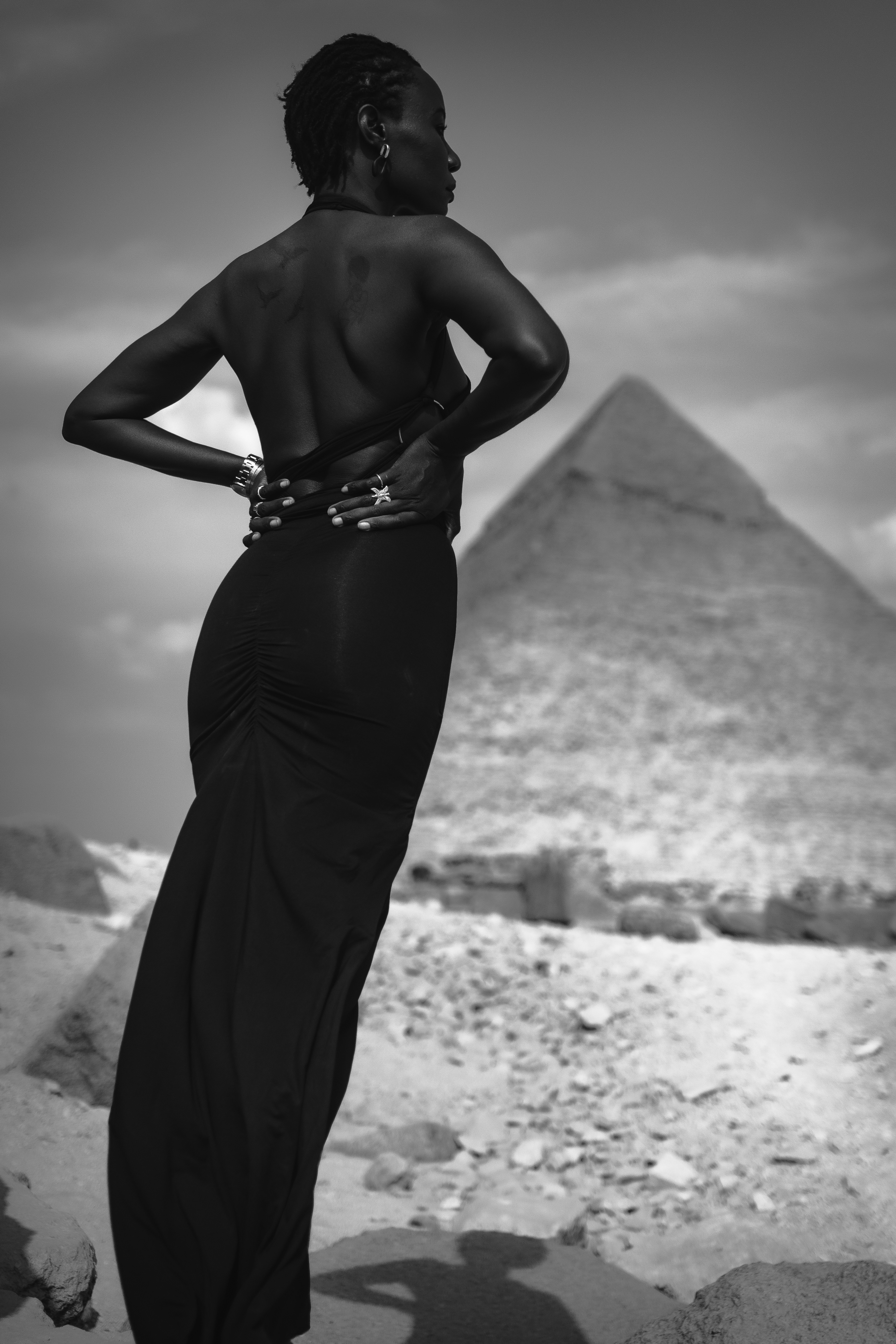 Elegance at the Desert Edge: Silhouette Against the Pyramid