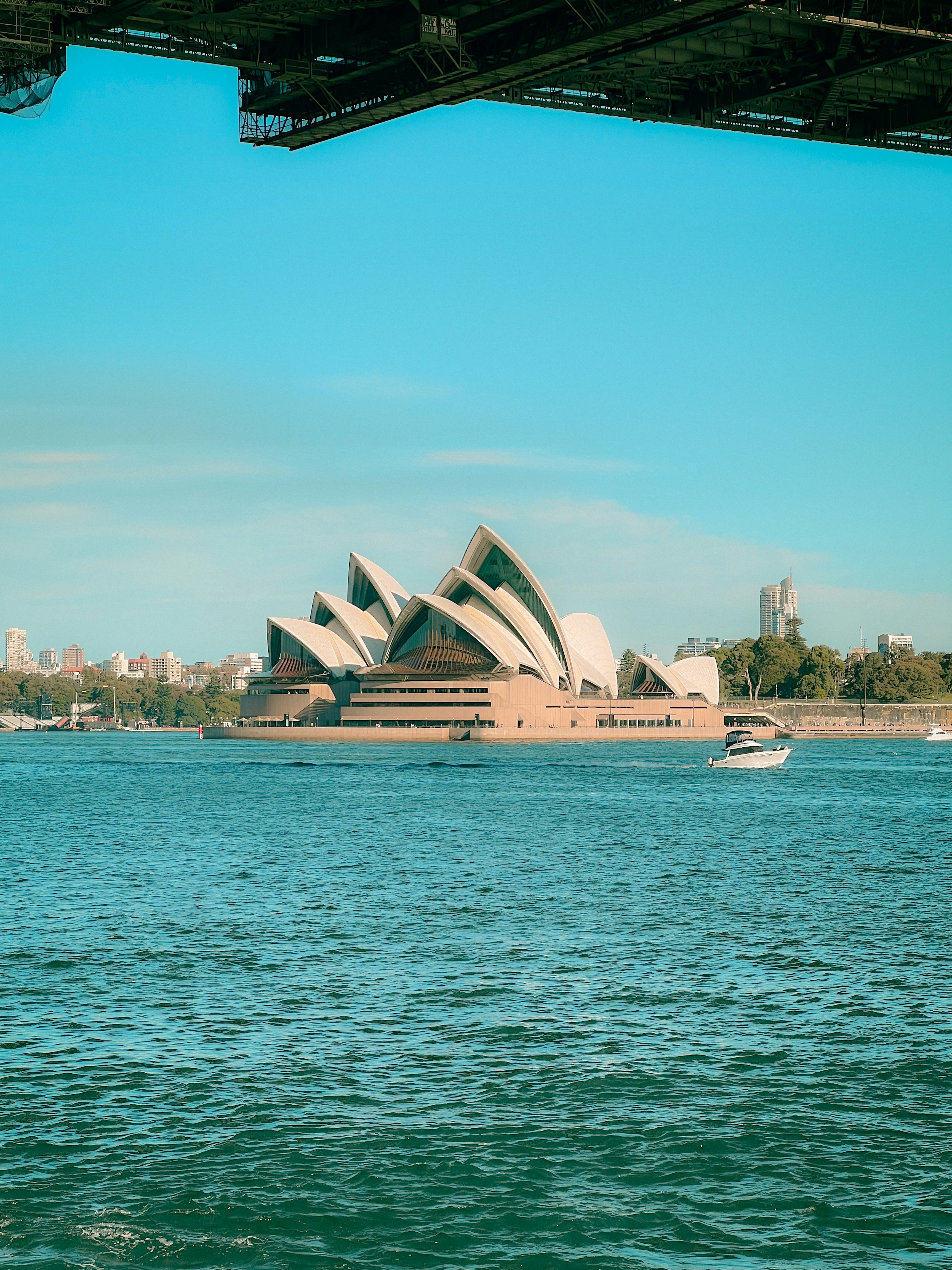 A view of the sydney opera house from across the water photo – Free ...