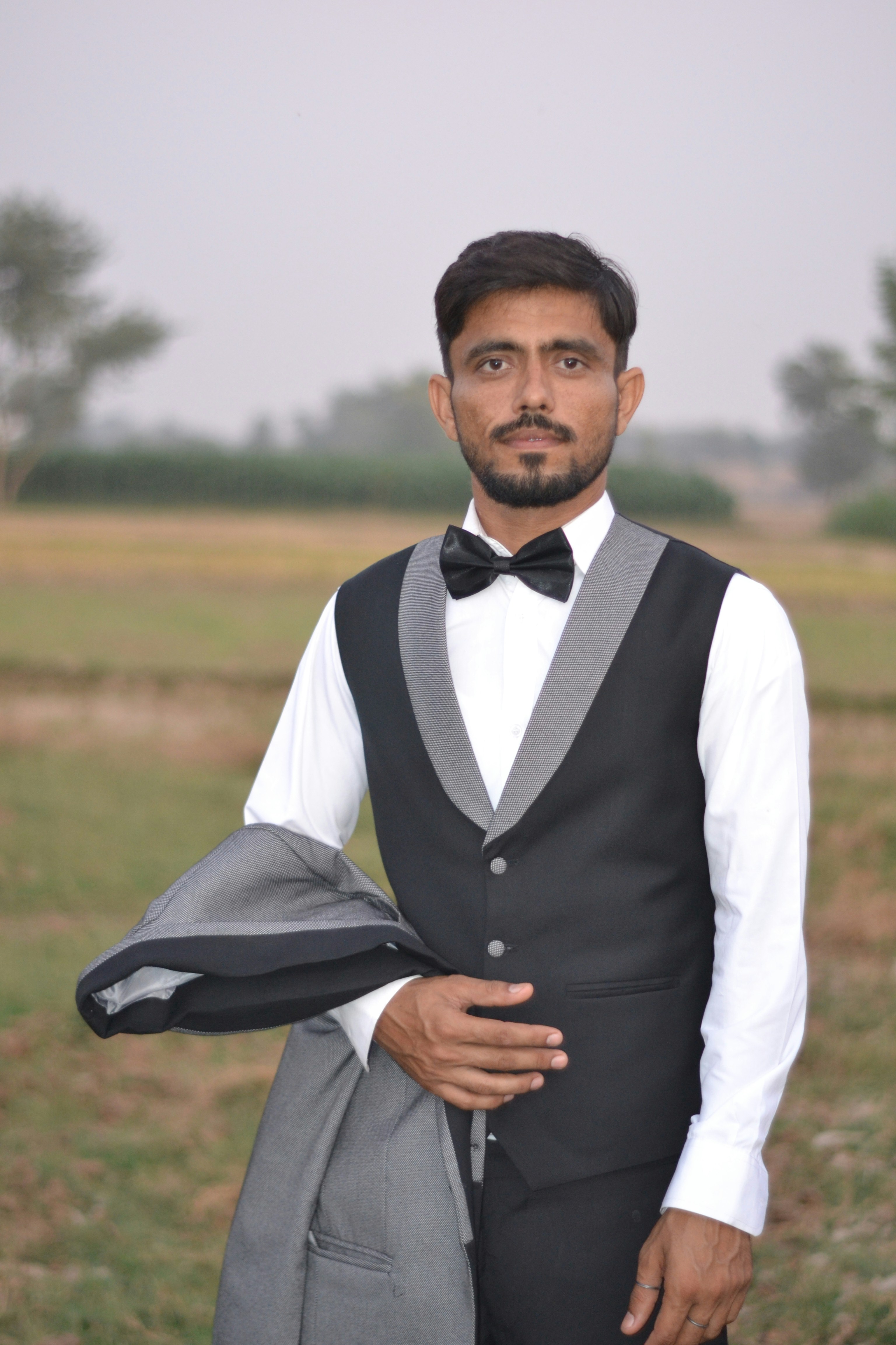 Dapper Moment: Groomed Portrait in Evening Fieldwear