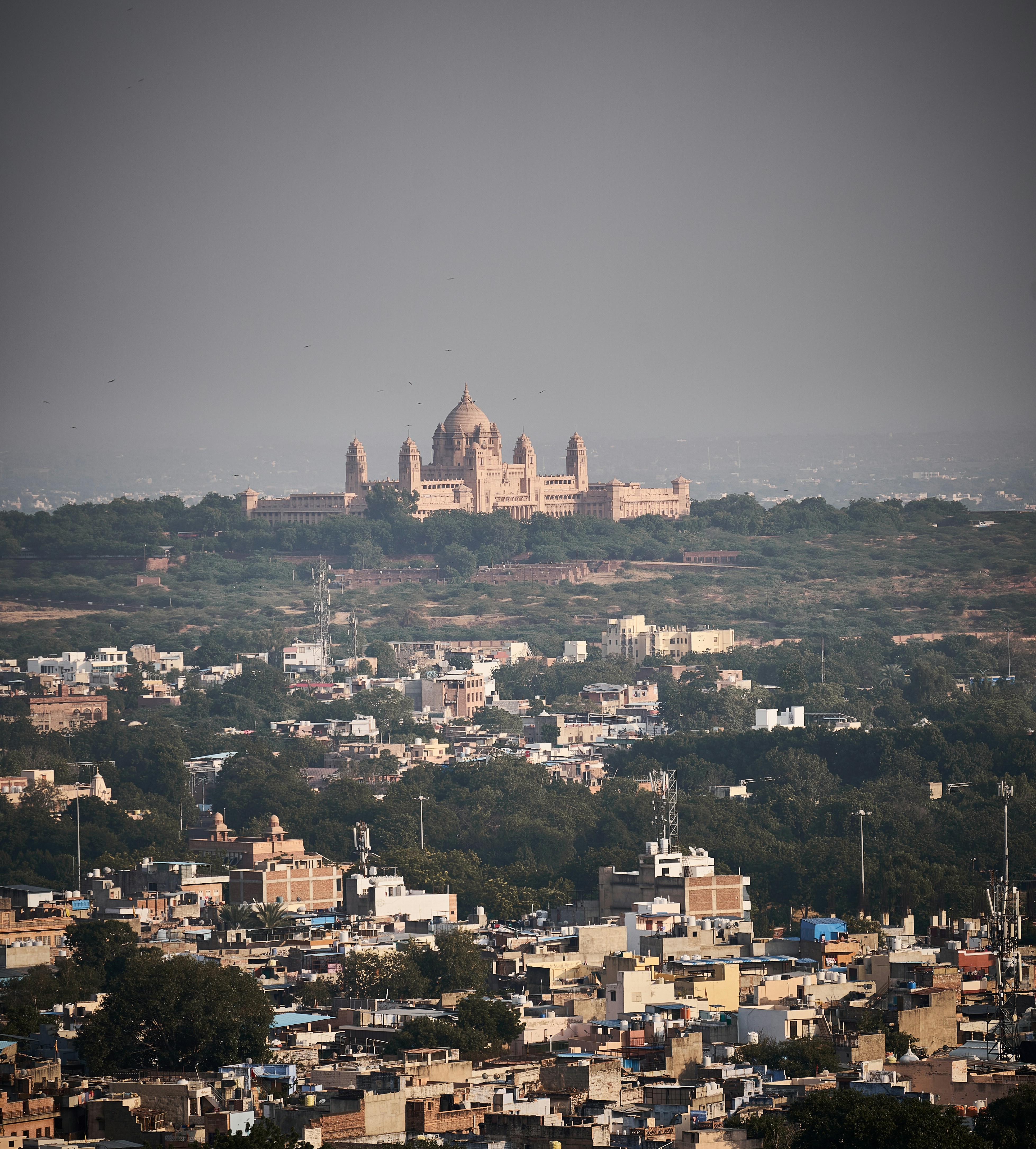 Hilltop Palace Rising Over a Patchwork City
