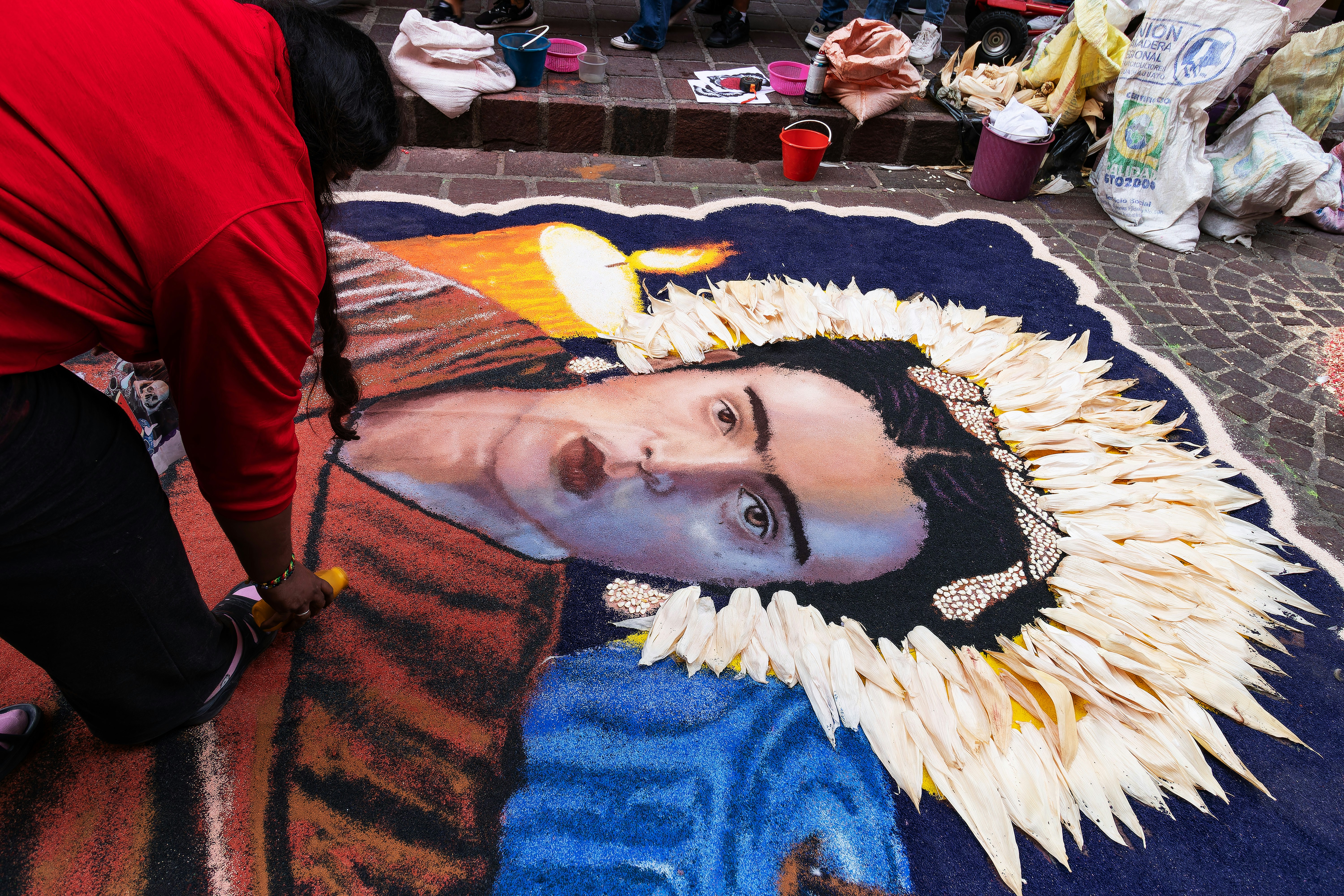 Feathered Halo on the Pavement: A Giant Chalk Portrait Emerges