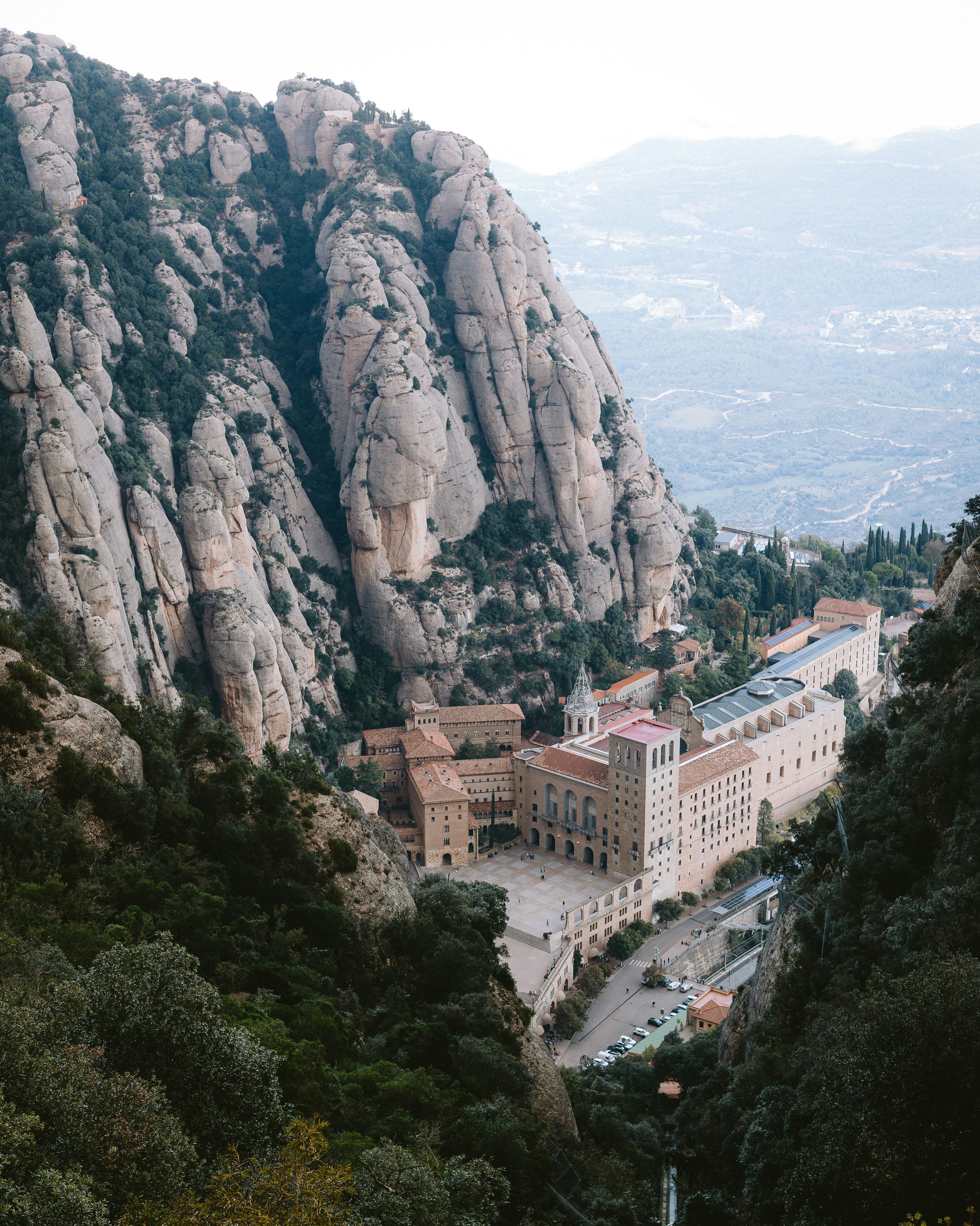A large building in the middle of a mountain