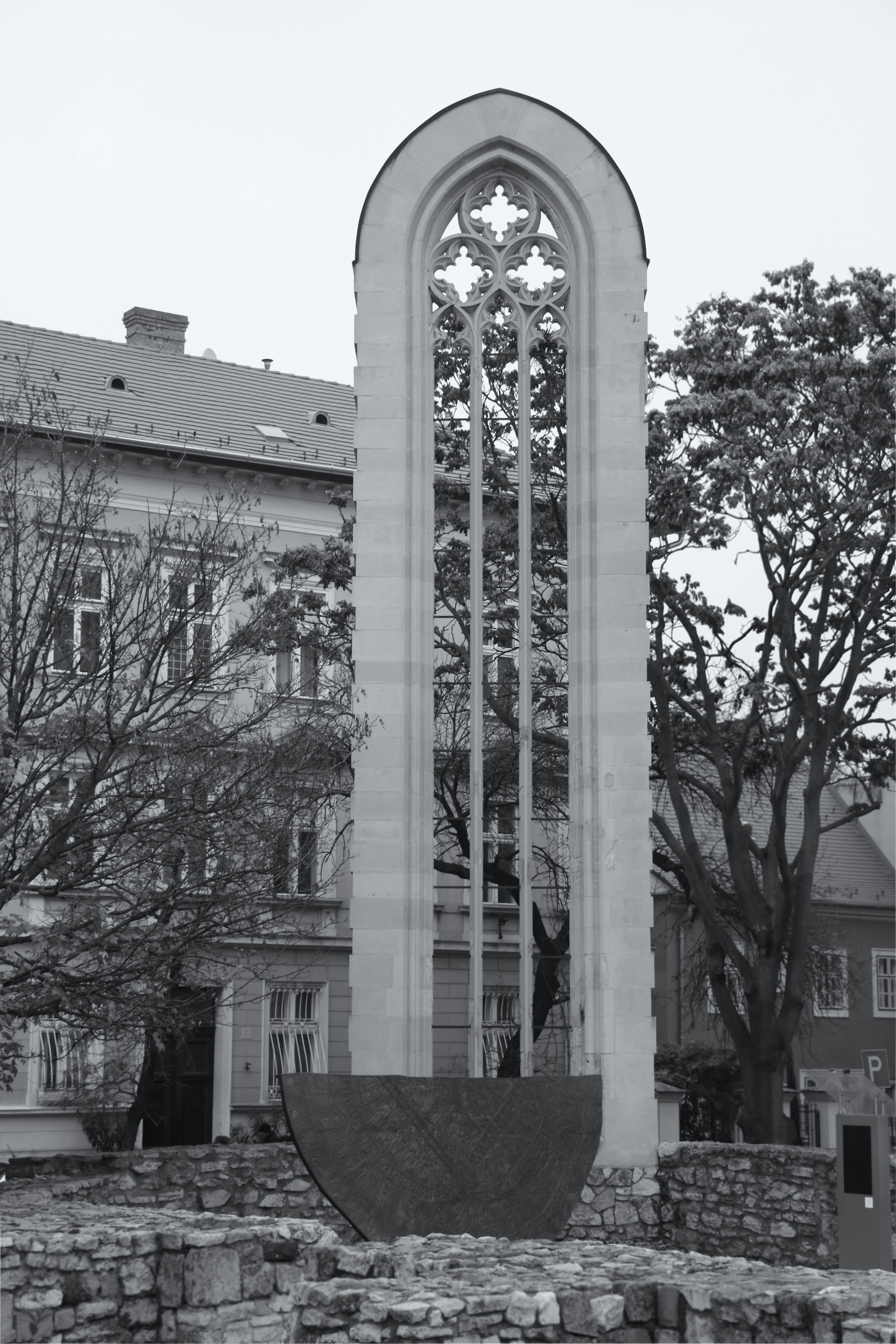 A tall clock tower sitting in the middle of a park photo – Free ...