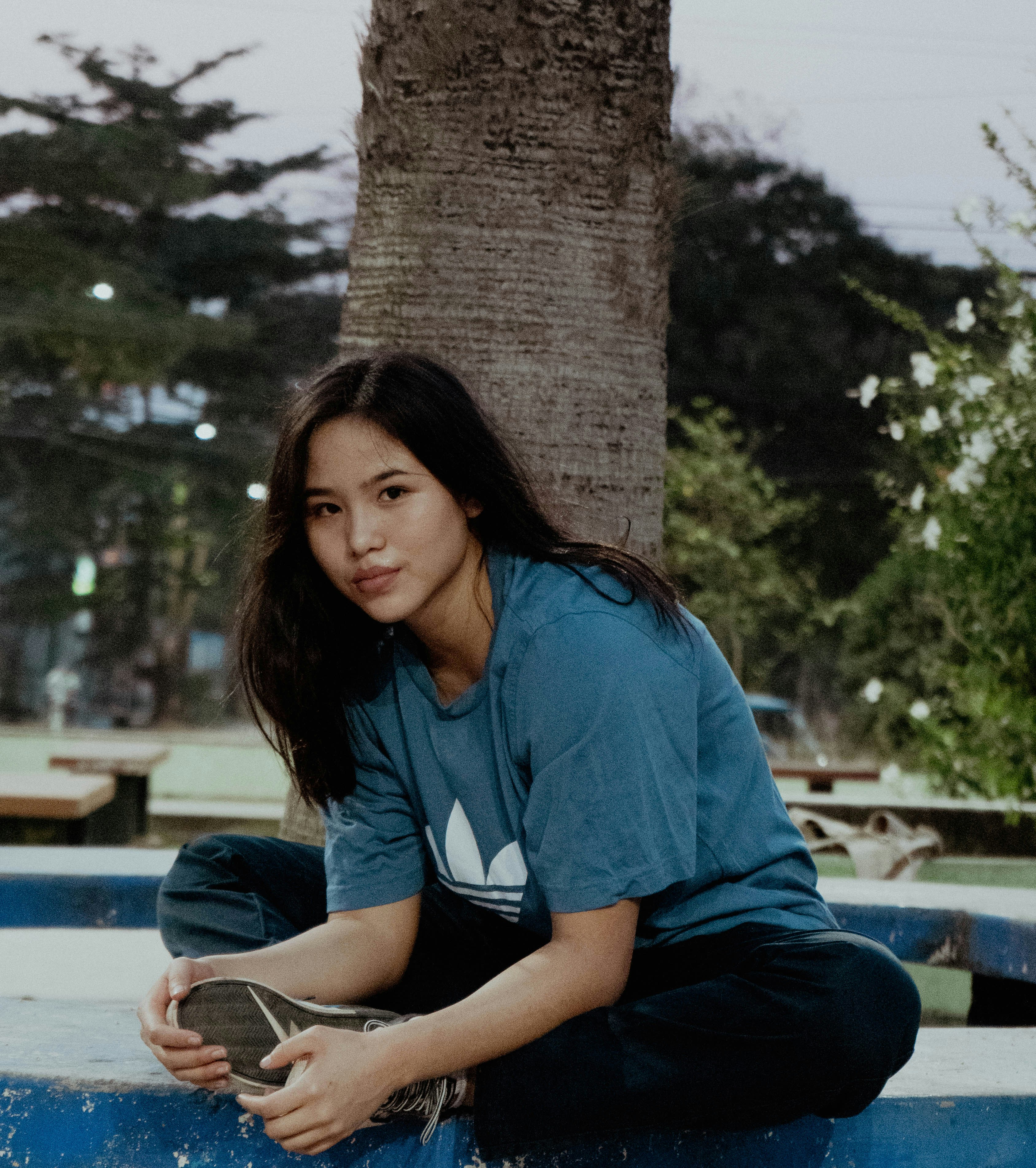 Blue Tee, Trunk and Tranquility: A Parkside Portrait